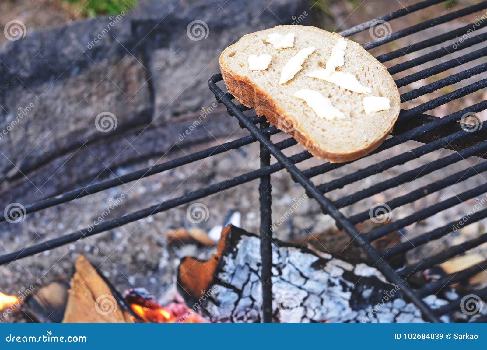 Bread on camping fire stock image. Image of fire, toast - 102684039