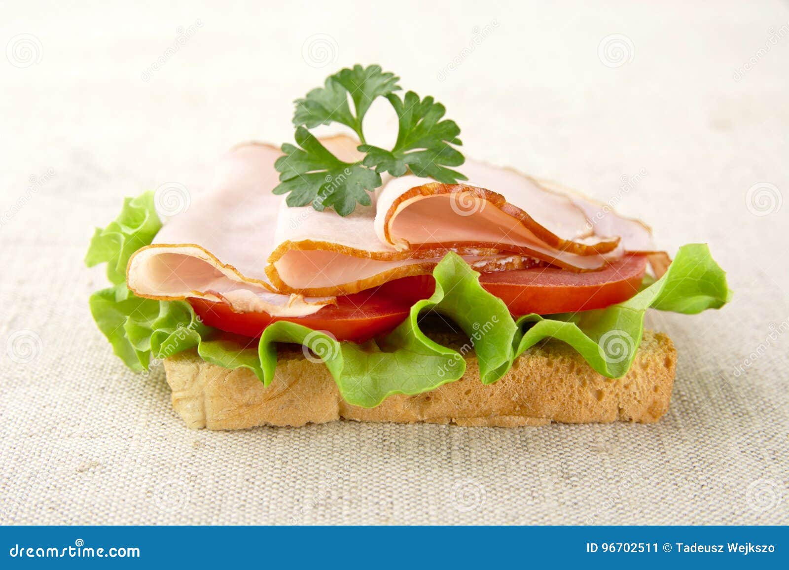 Slice of Bread with Lettuce,cold Cuts on Linen Tablecloth Stock Image ...