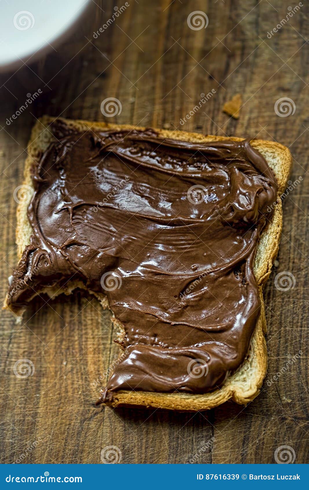 Slice of Bread with Nutella Stock Image - Image of cereal, crumbs: 87616339