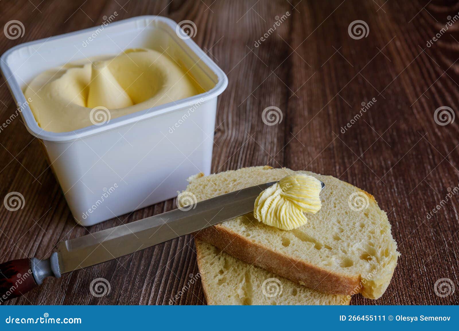 Slice of Bread Spread with Creamy Butter. Stock Image - Image of ...