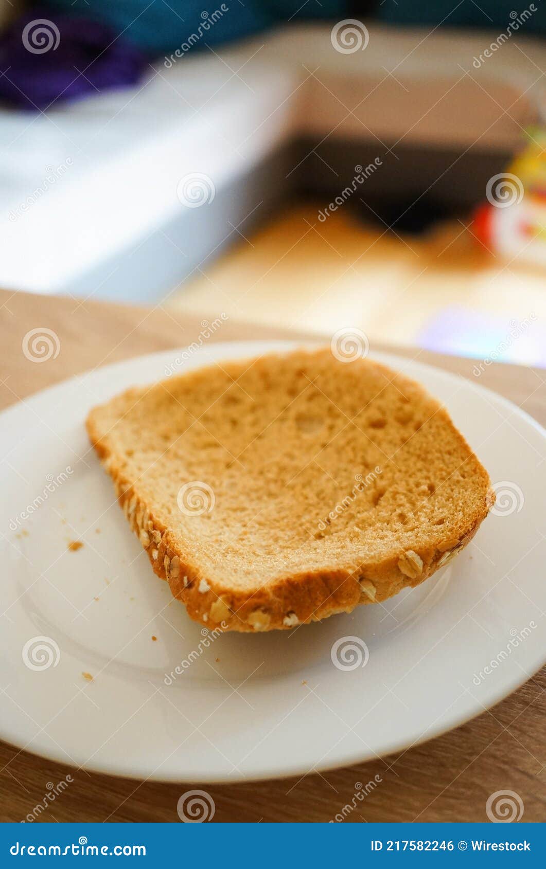 Bread slice on a plate stock photo. Image of food, bread - 217582246