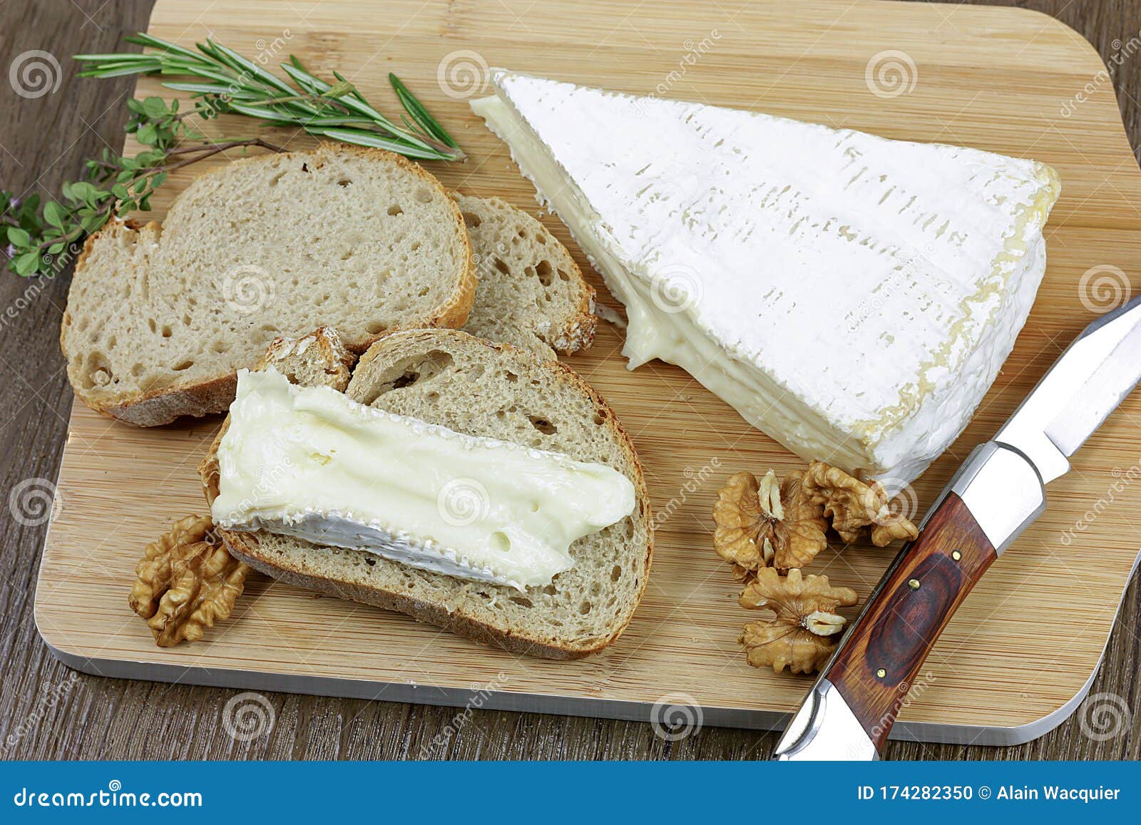 Slice of brie and bread stock photo. Image of meaux - 174282350