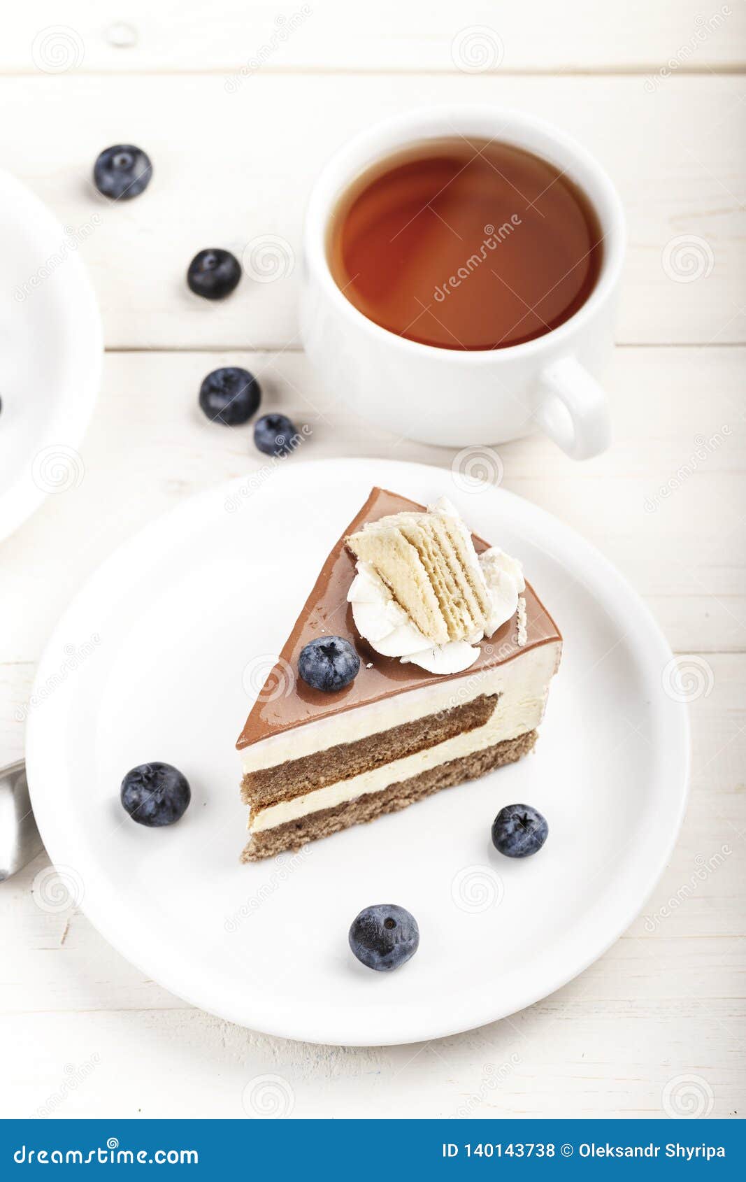 A slice of cake with tea stock photo. Image of cheese - 140143738