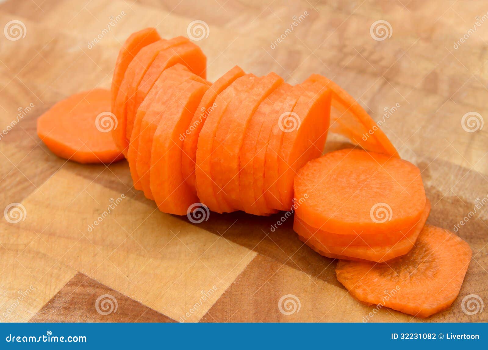 Slice Carrots on the Chopping Block Stock Photo - Image of color ...