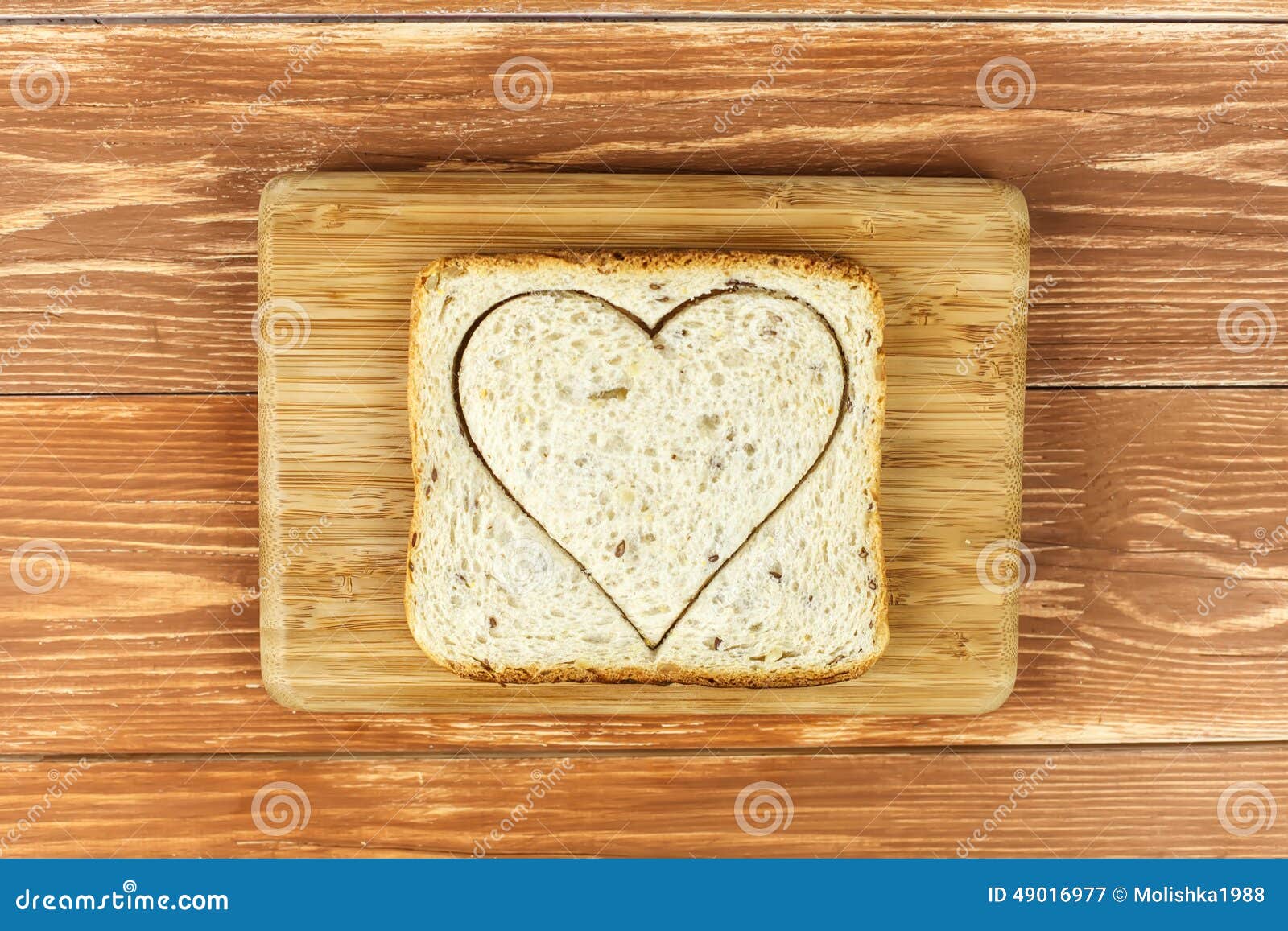 Slice of Cereal Toast Bread with Cut Out Heart Stock Image - Image of ...