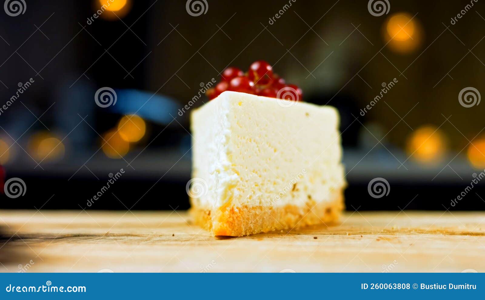 A Slice of Cheesecake Cake with a Sprig of Currant. Macro and Slider ...