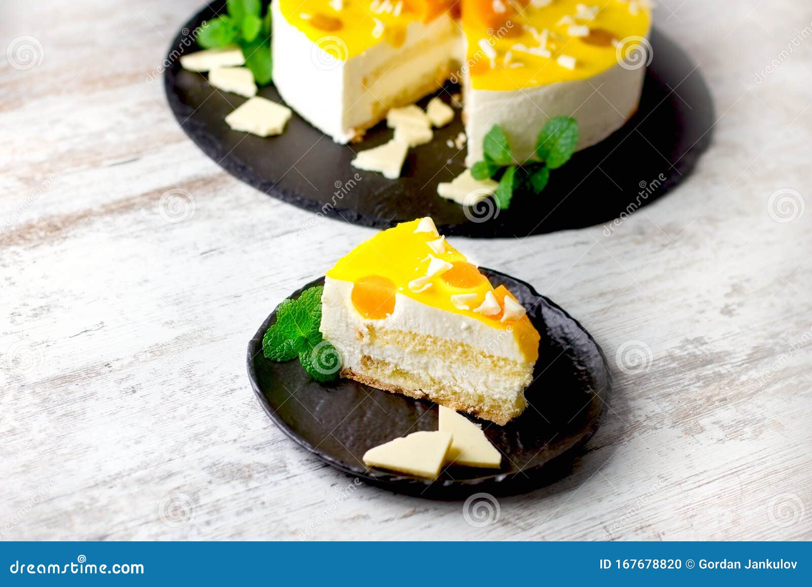 Slice of Cheesecake on Rustic Plate on Rustic Table Stock Photo - Image ...