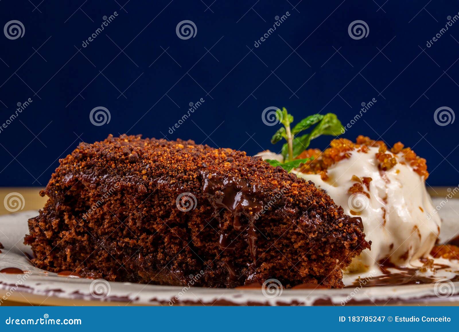 Slice of Chocolate Cake with Vanilla Ice Creamon Blue Background Stock ...