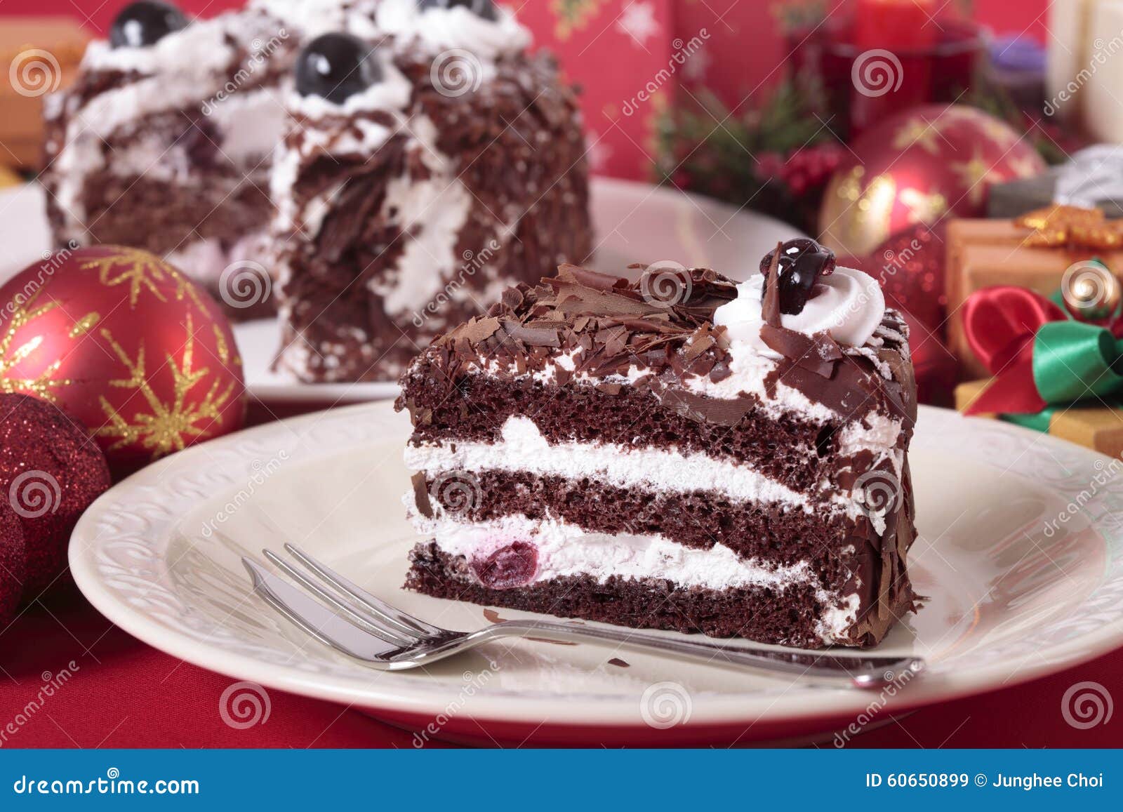 Slice of Christmas Black Forest Gateau Cake on Plate with Decoration ...