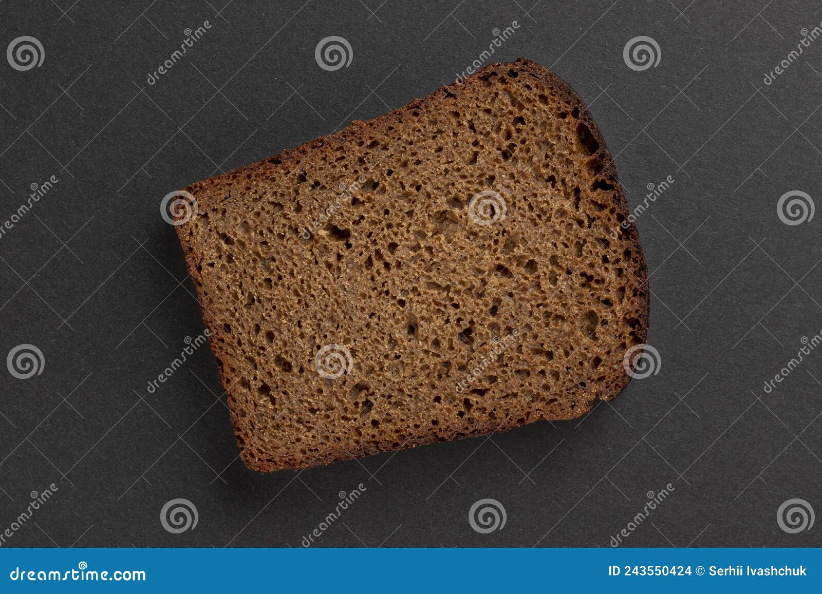 Slice of dark bread stock photo. Image of slice, wheat - 243550424