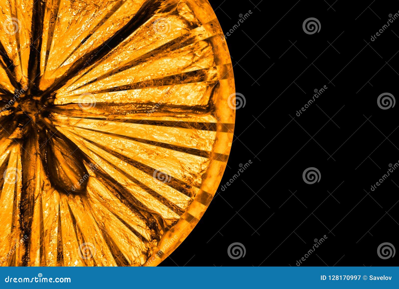 A Slice of Dried Yellow Lemon Processed and Isolated on a Black ...
