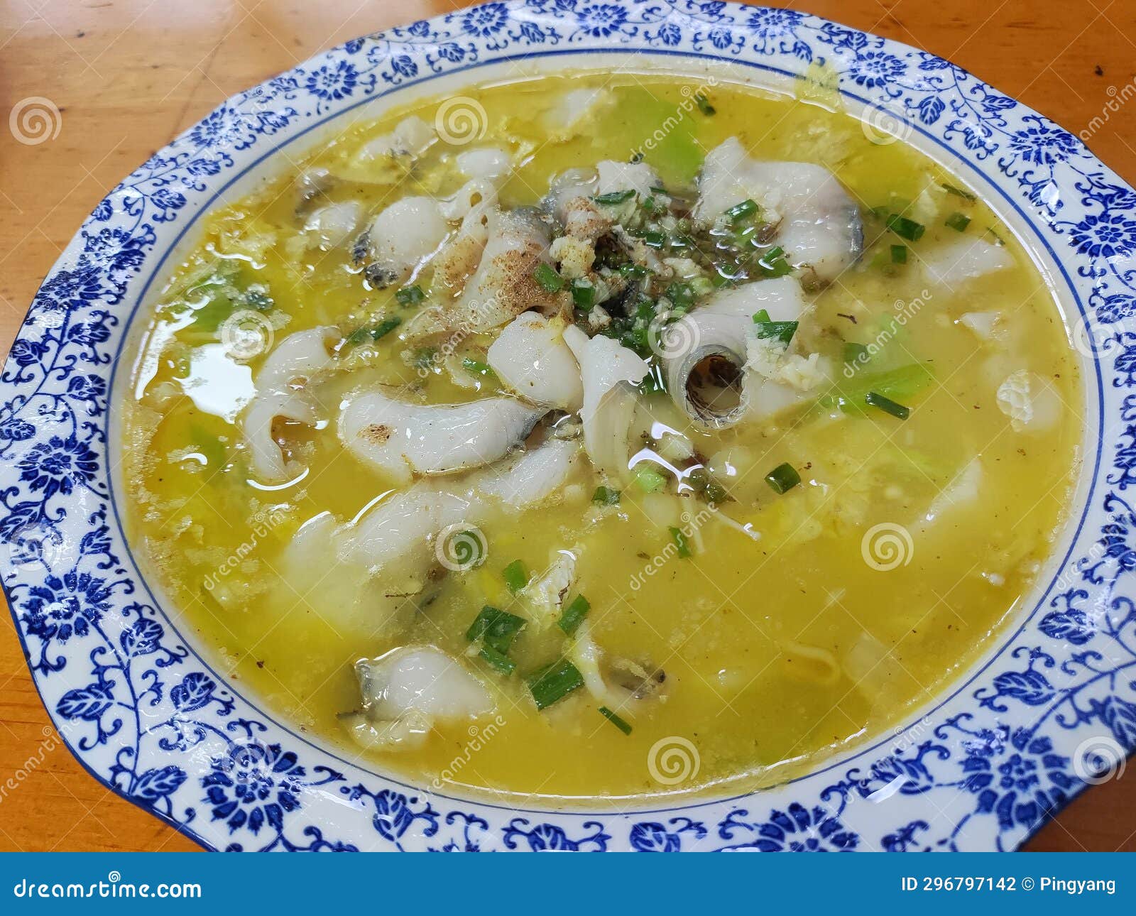 Slice of Fish with Sour Cabbage in the Yellow Soup Stock Photo - Image ...