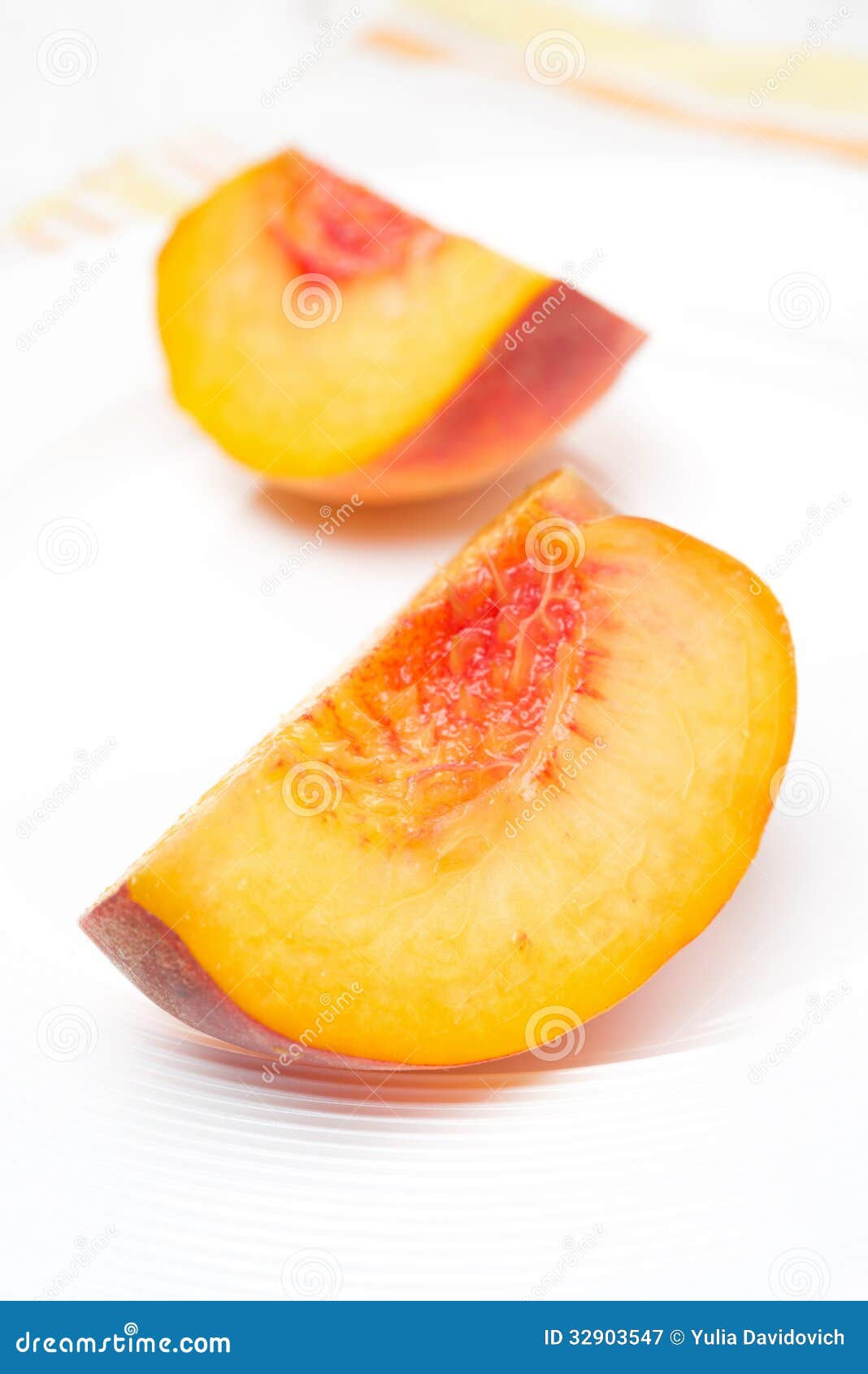Slice of Fresh Peach on a Plate, Close-up Stock Image - Image of peach ...