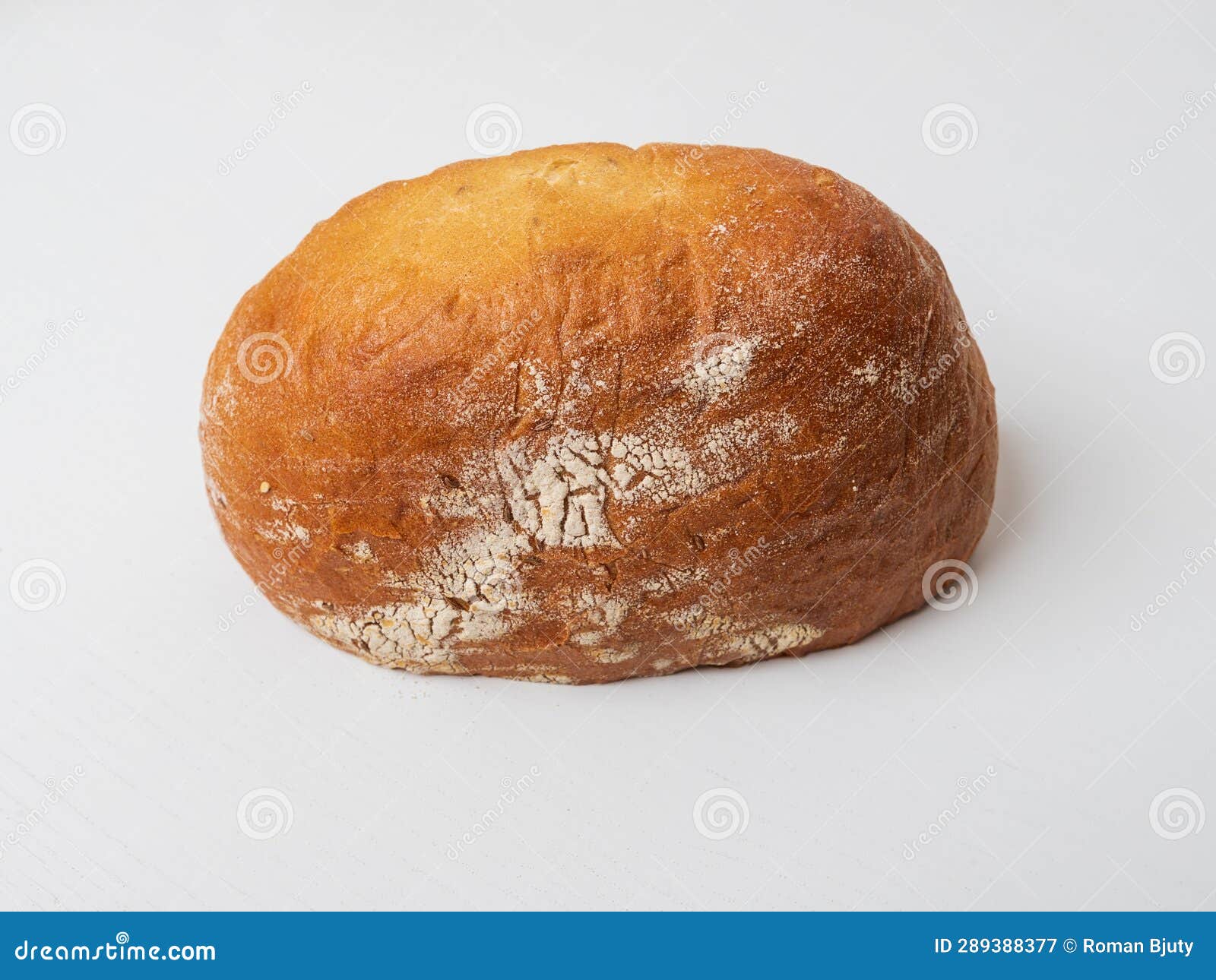 A Slice of Fresh Round Loaf of Bread on a White Table Stock Image ...
