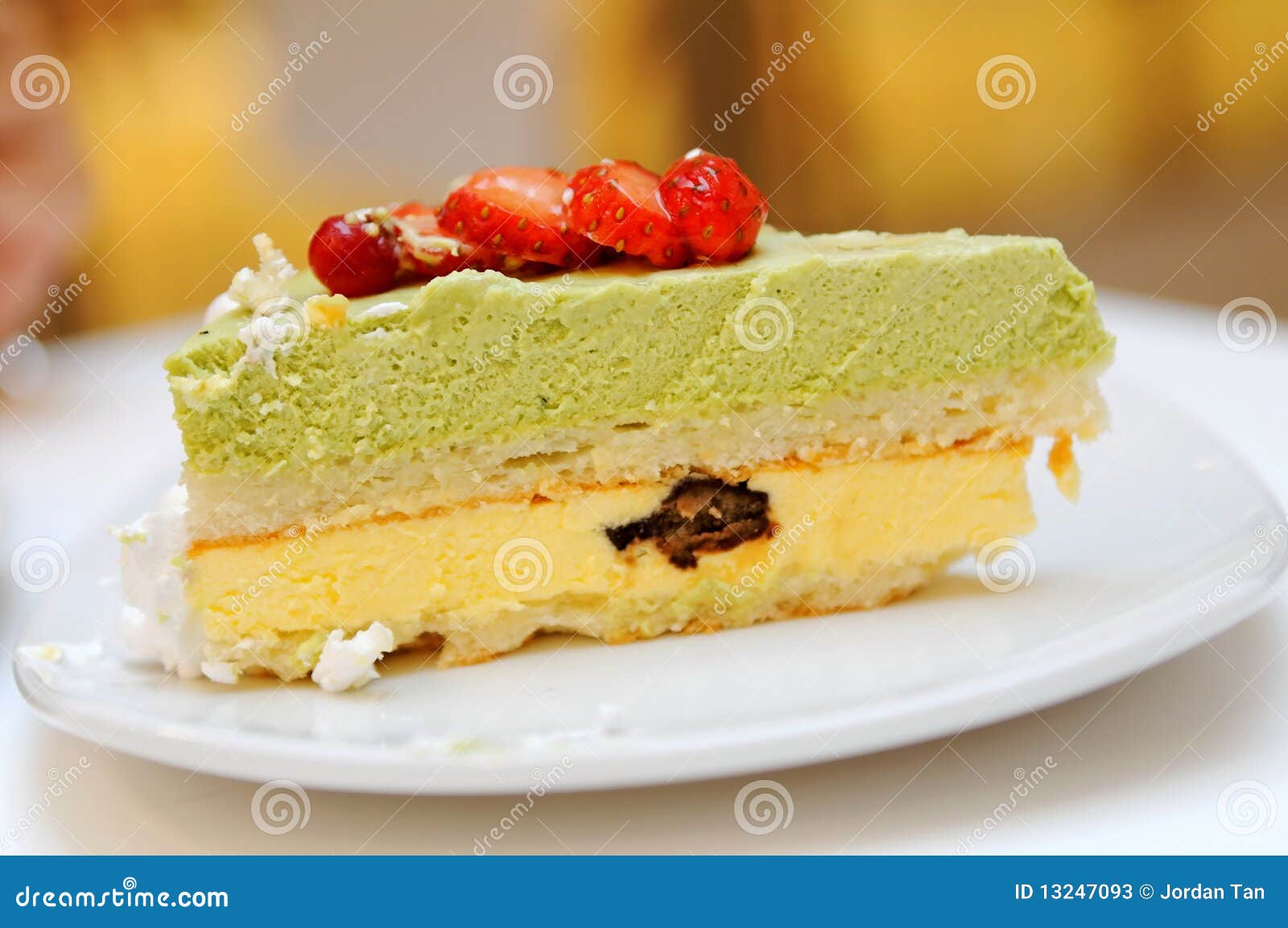 Slice of green tea cake stock image. Image of cream, slice - 13247093