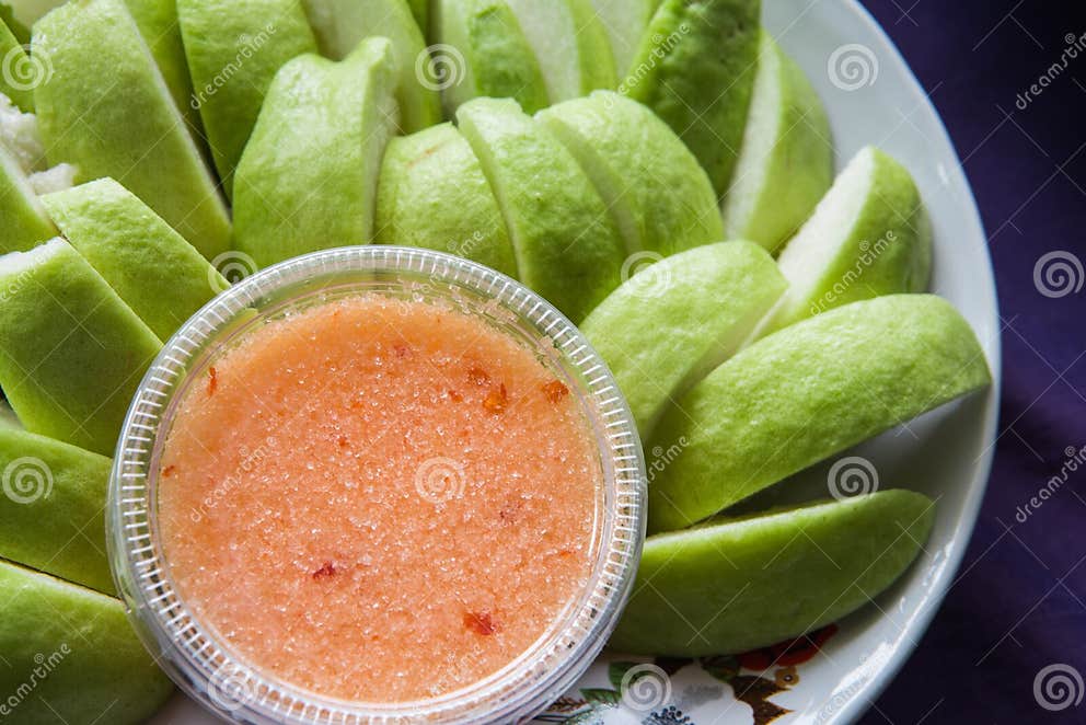 Slice of guava on dish stock photo. Image of background - 63650998