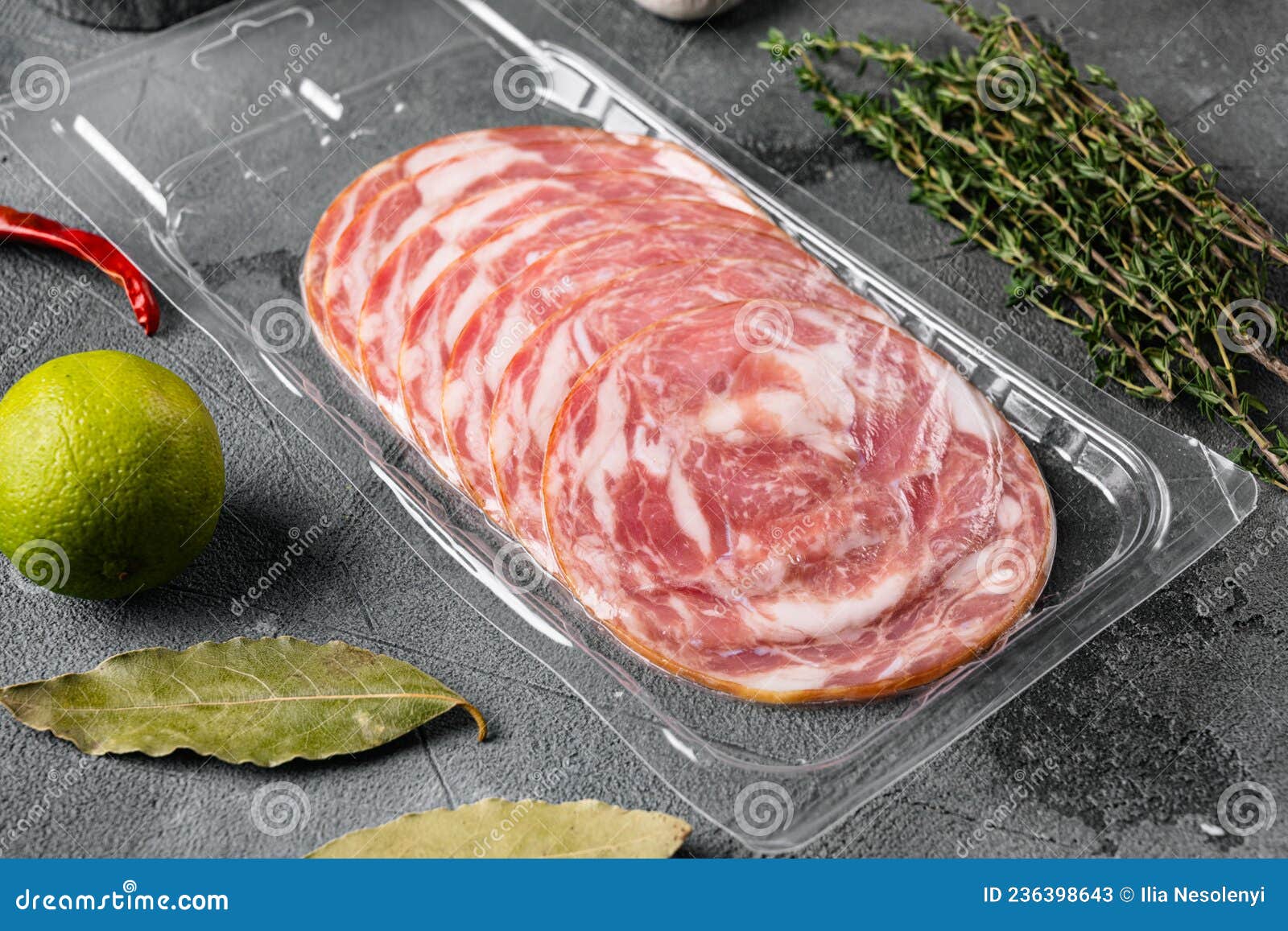 Slice of Italian Ham and Meat in Vacuum Package, on Gray Stone Table ...
