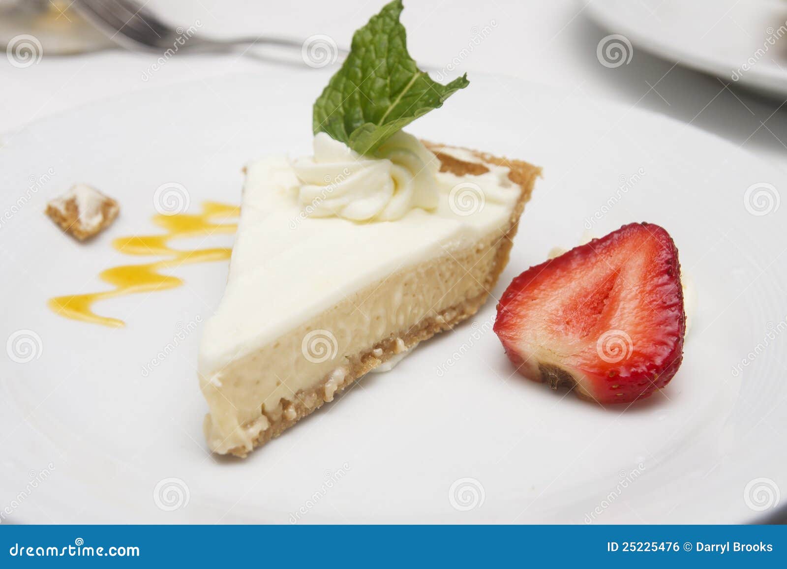 Slice of Key Lime Pie and a Strawberry Stock Photo - Image of sauce ...