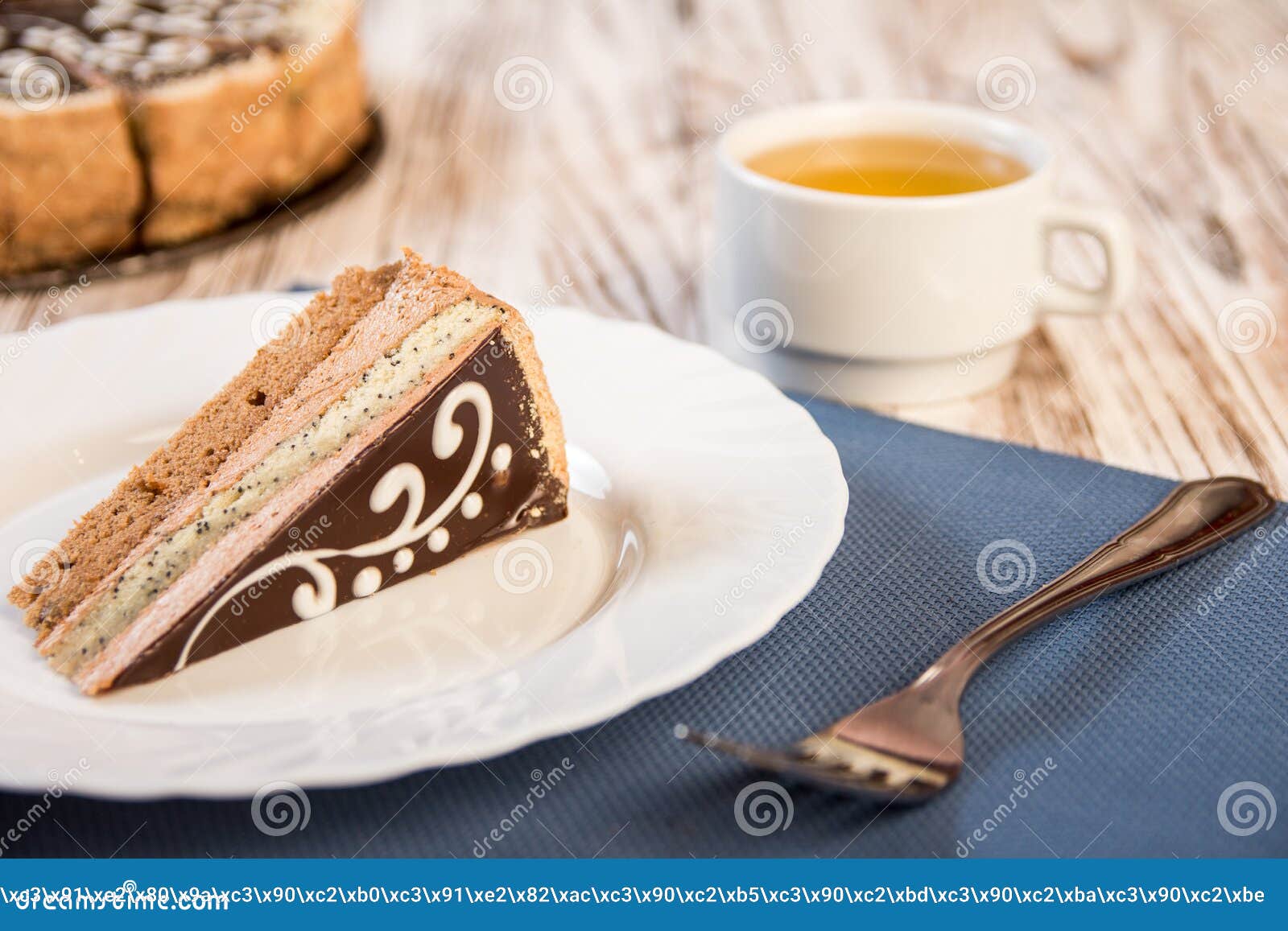 Slice of Layered Cake with a Cup of Tea Stock Photo - Image of food ...