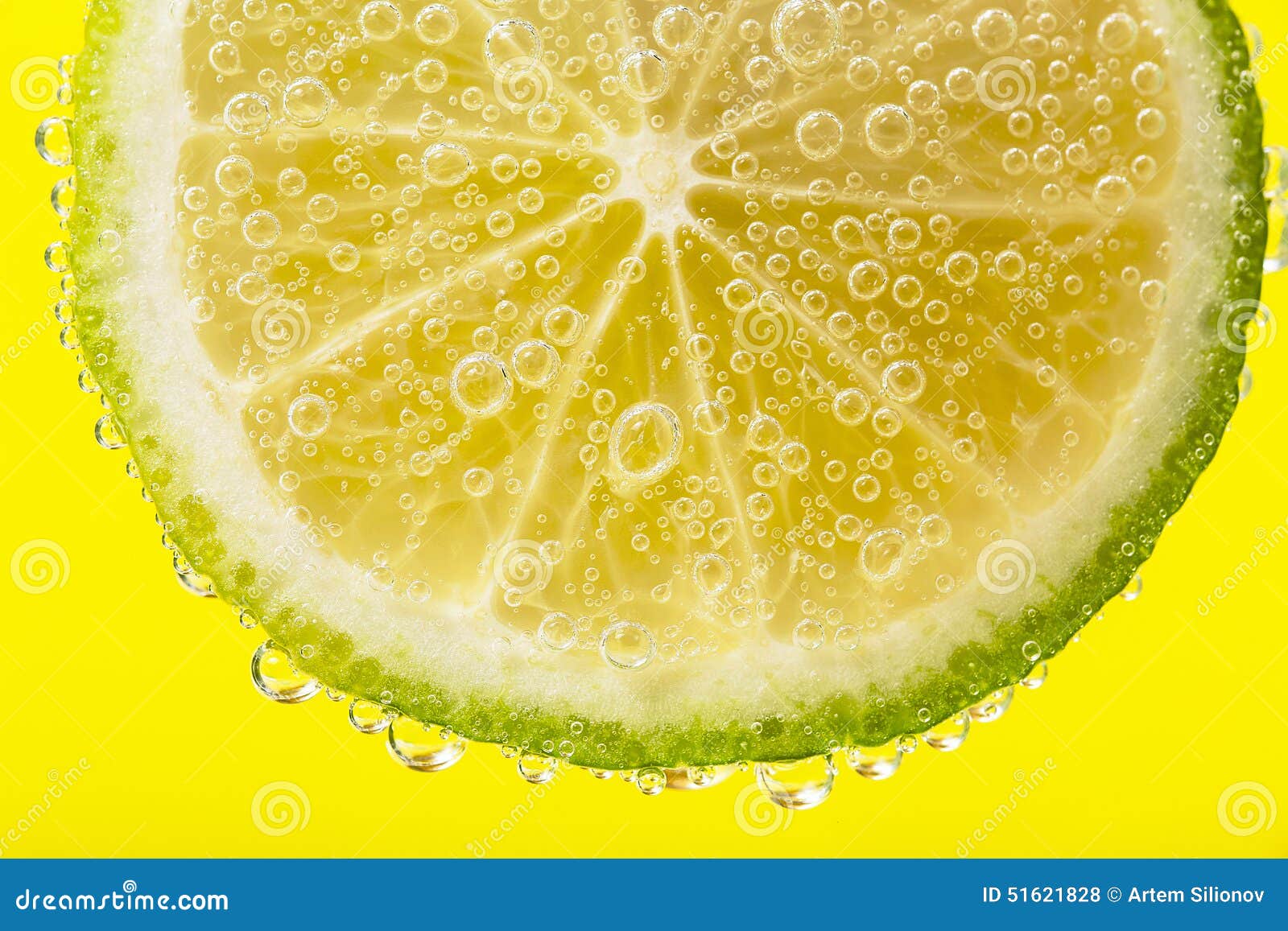 A Slice Of Lemon In Bubbles Stock Photo - Image of macro, spring: 51621828