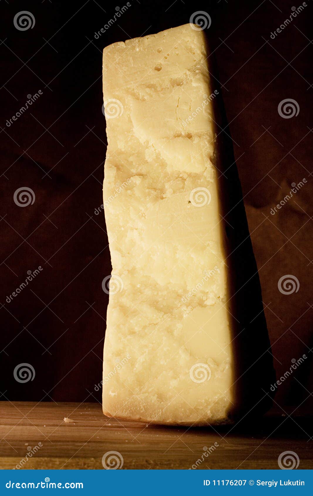 Slice of Parmesan cheese stock image. Image of cheese - 11176207