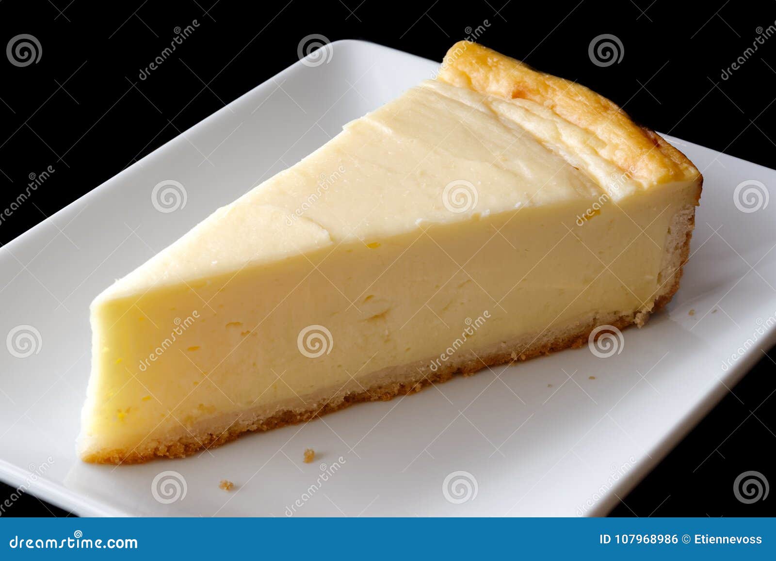 A Slice of Plain Baked Cheesecake on White Ceramic Plate. Black Stock Photo - Image of piece ...