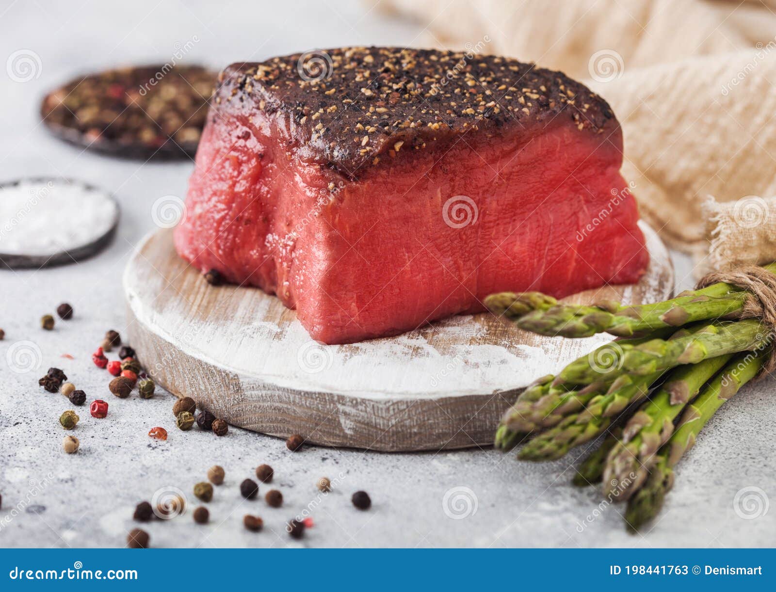 Slice of Raw Beef Topside Joint with Salt and Pepper on Round Chopping ...