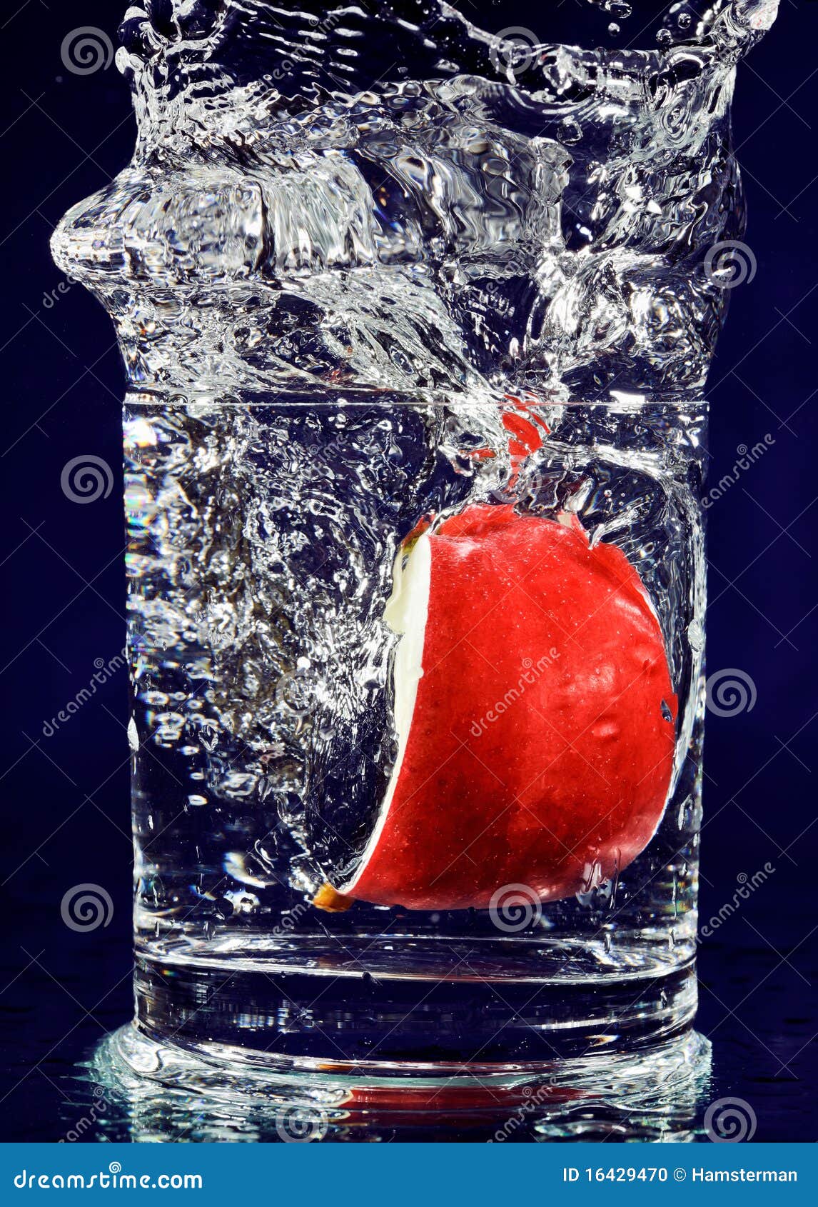 Slice of Red Apple Falling Down in Glass Stock Photo - Image of energy ...