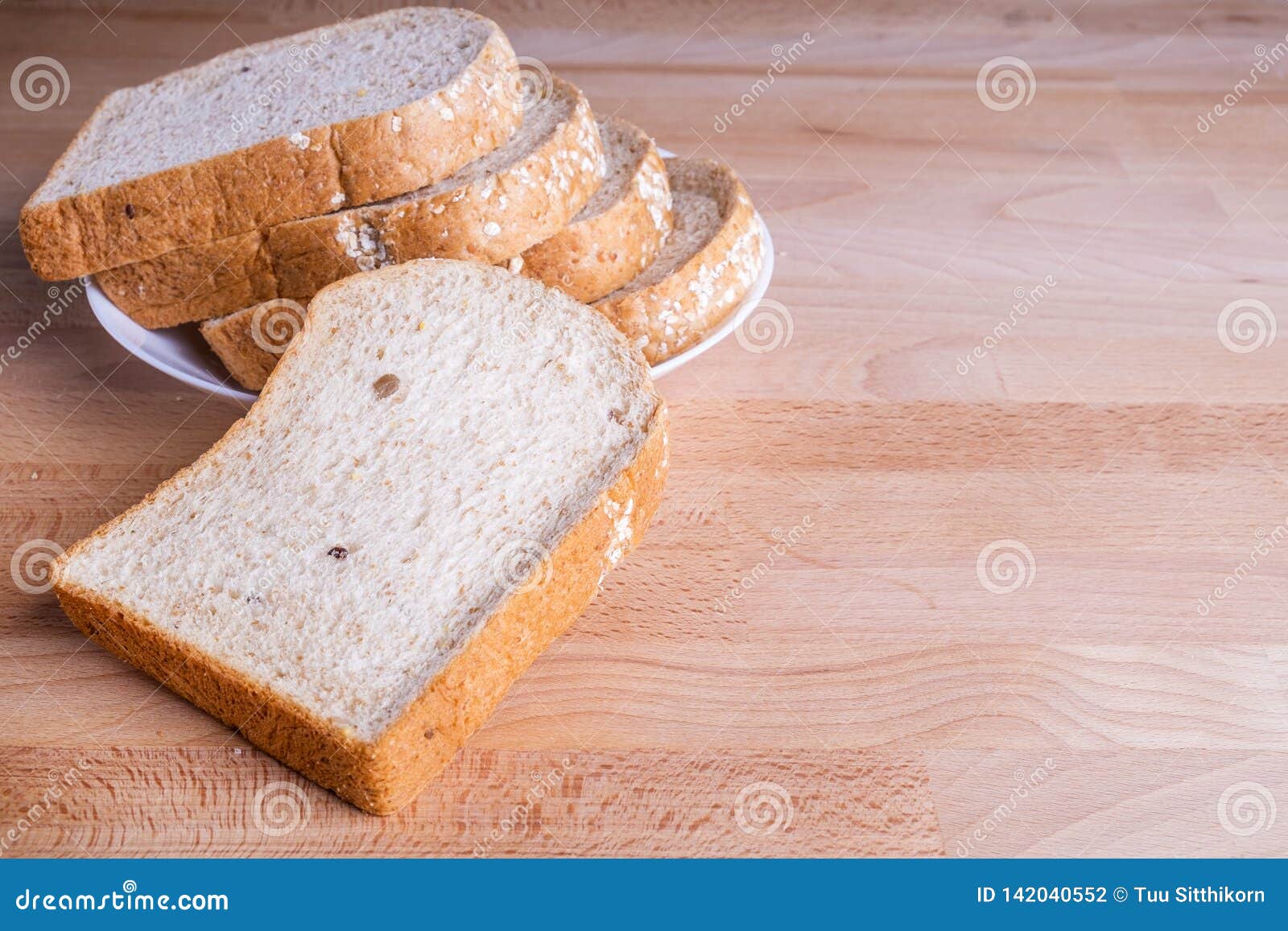 Slice Whole Wheat Bread on Wooden Floor Background Stock Photo - Image ...