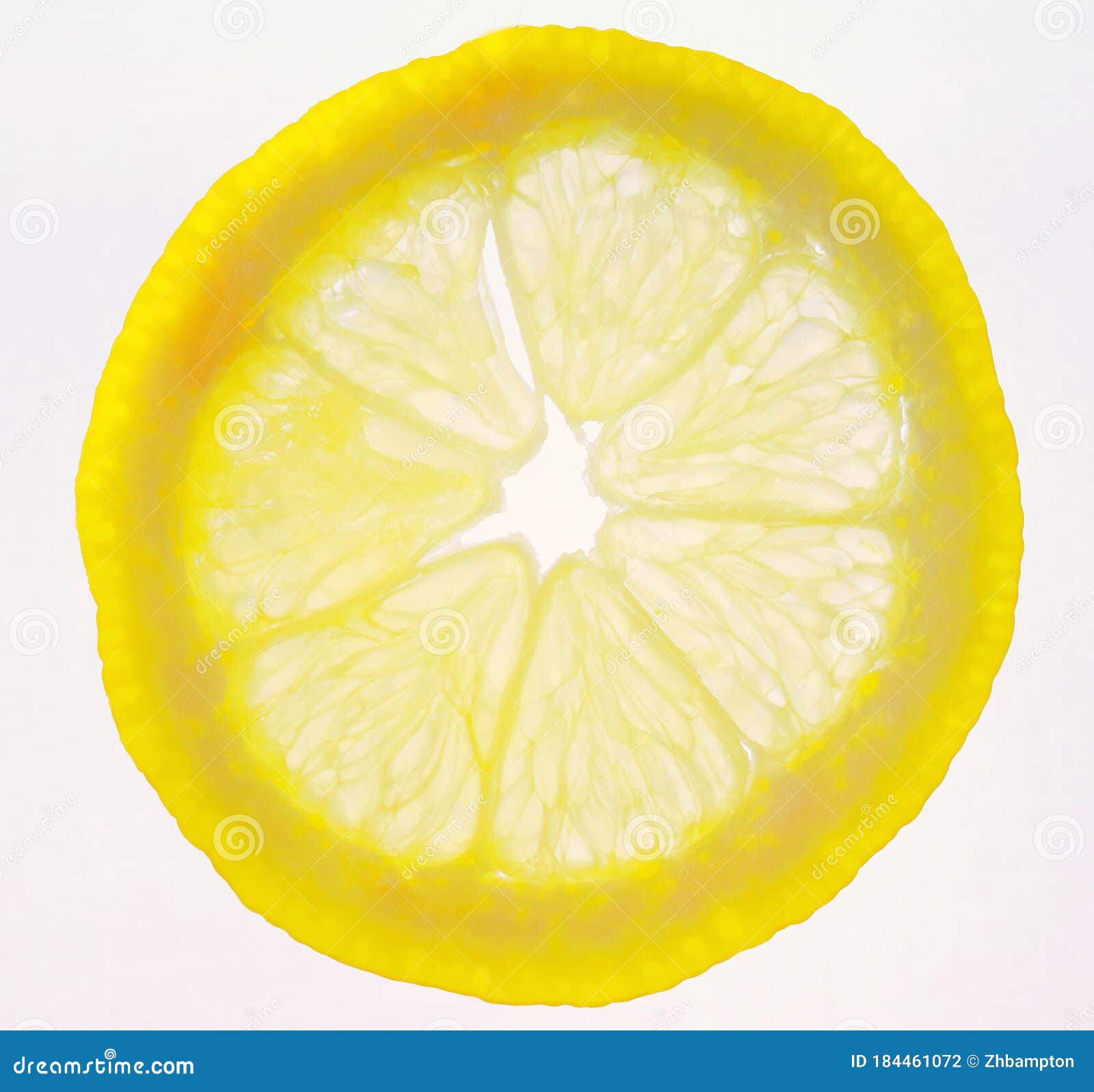 Slice of yellow lemon stock photo. Image of healthful - 184461072