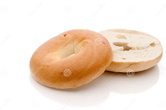 Sliced Bagel on Reflective Surface Stock Photo - Image of edible ...