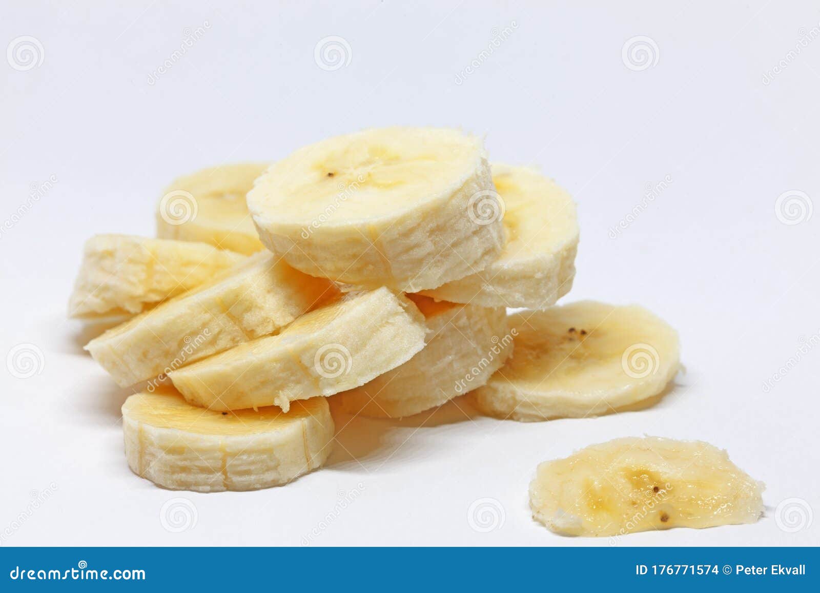 Sliced Banana Pieces in a Pile on White Background Stock Photo - Image ...