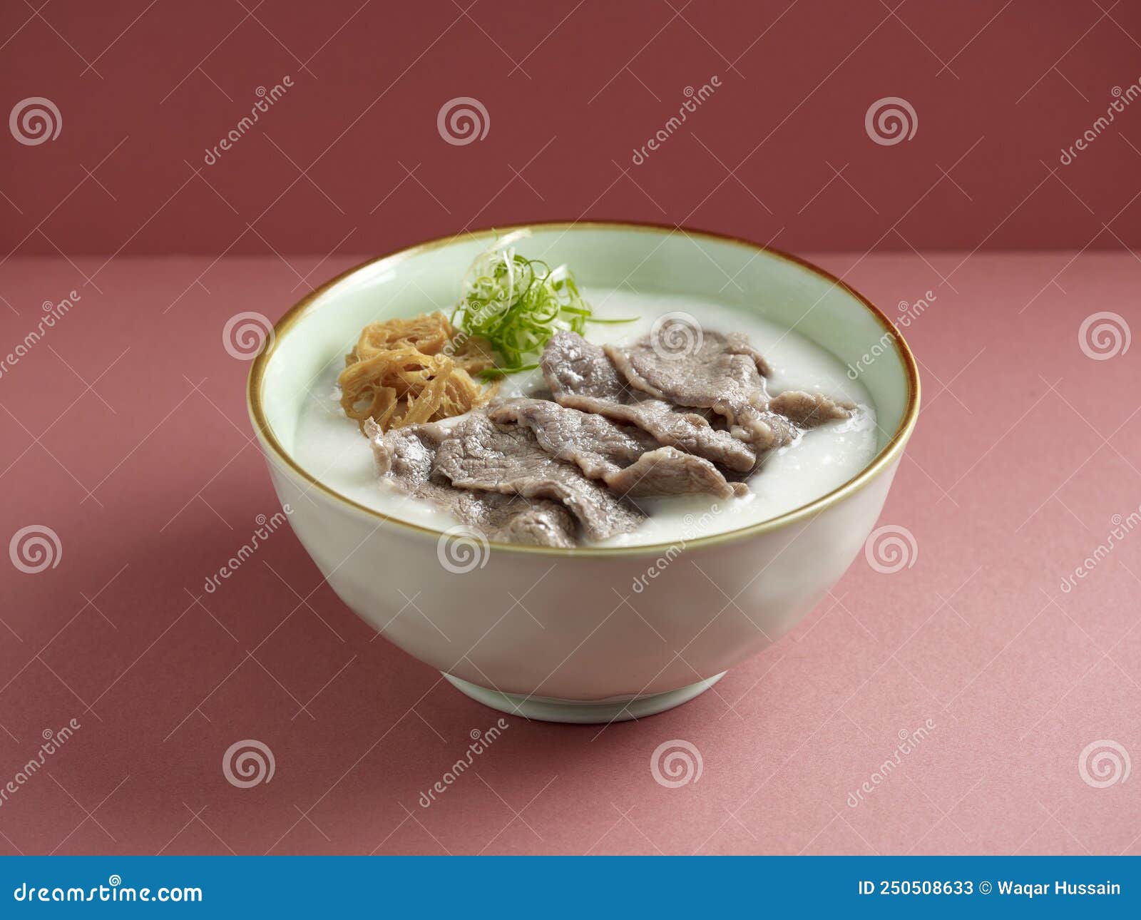 Sliced Beef Congee Served in a Dish Isolated on Mat Side View on Grey ...