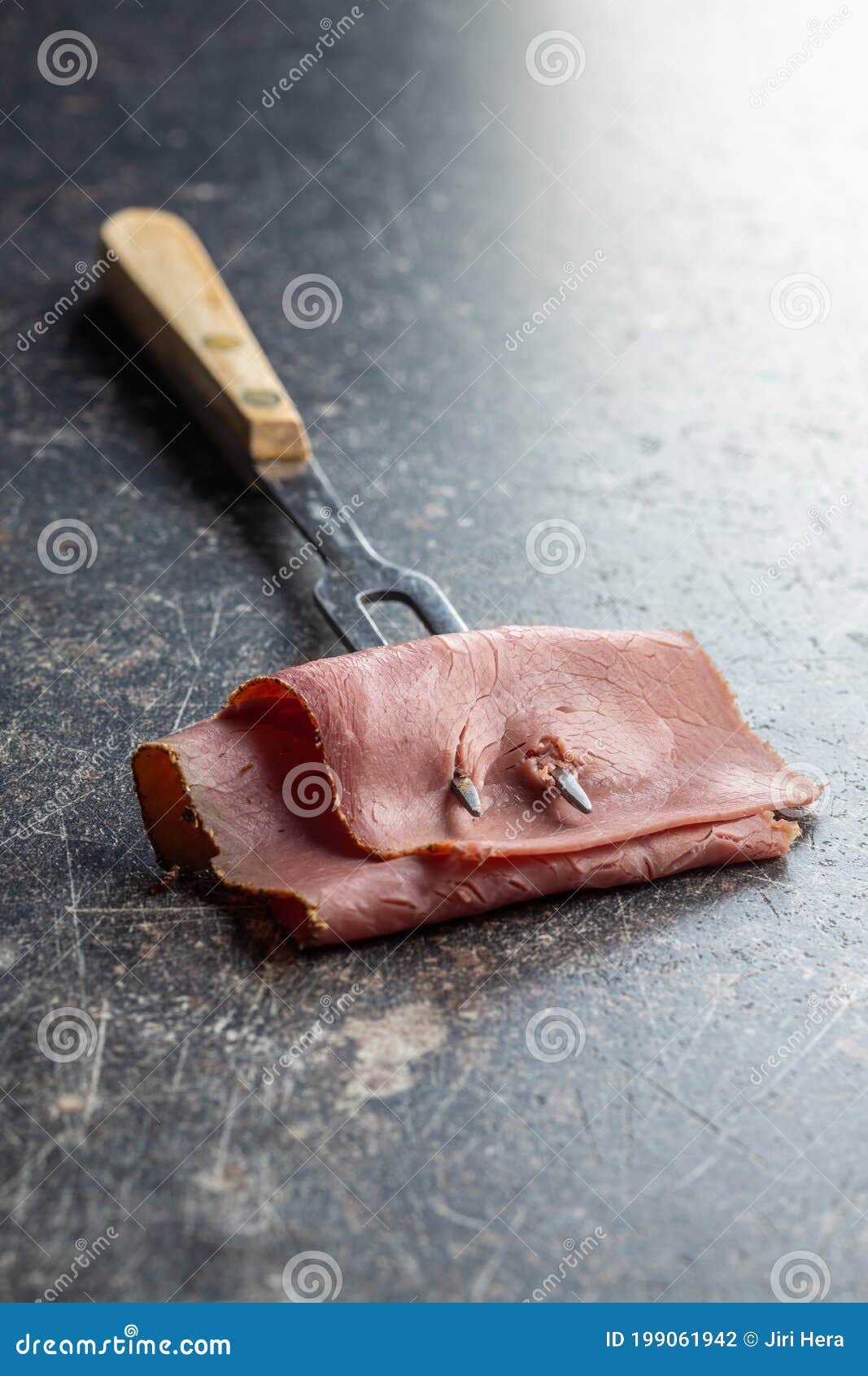 Sliced beef ham and fork stock photo. Image of organic - 199061942