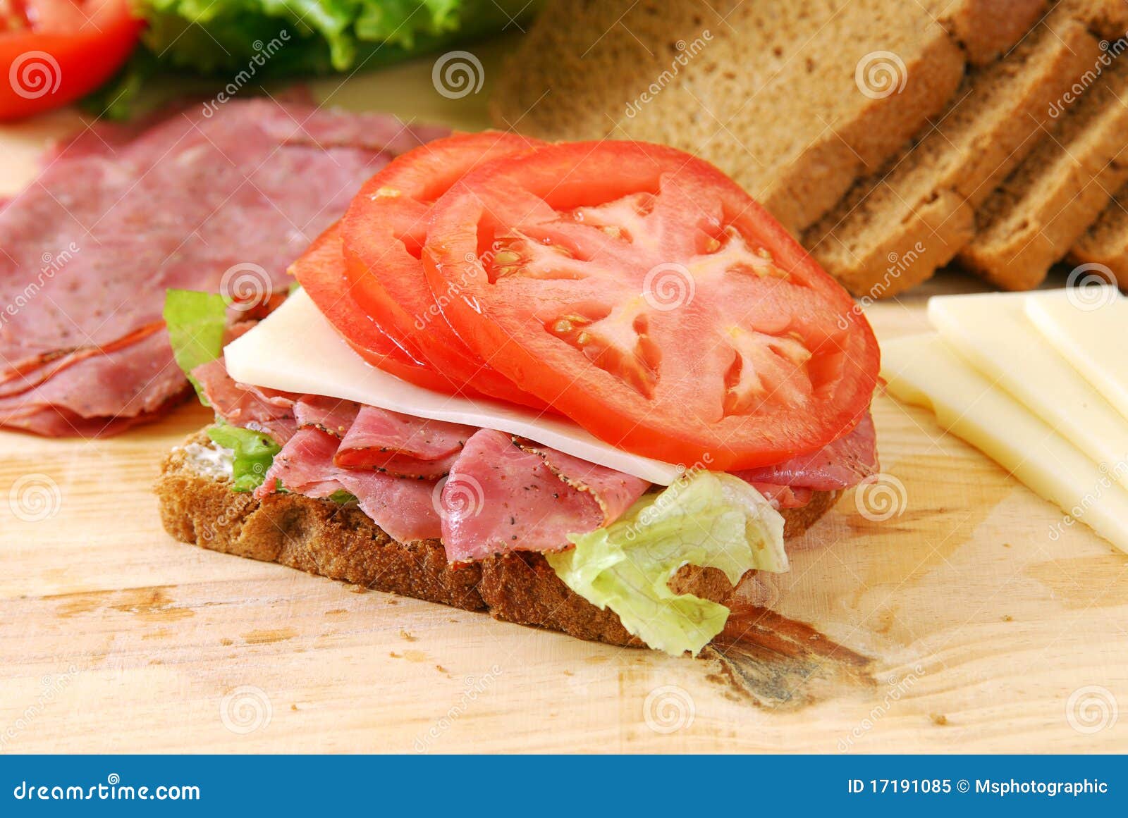 Sliced Beef Sandwich Being Prepared Stock Image - Image of tomato ...