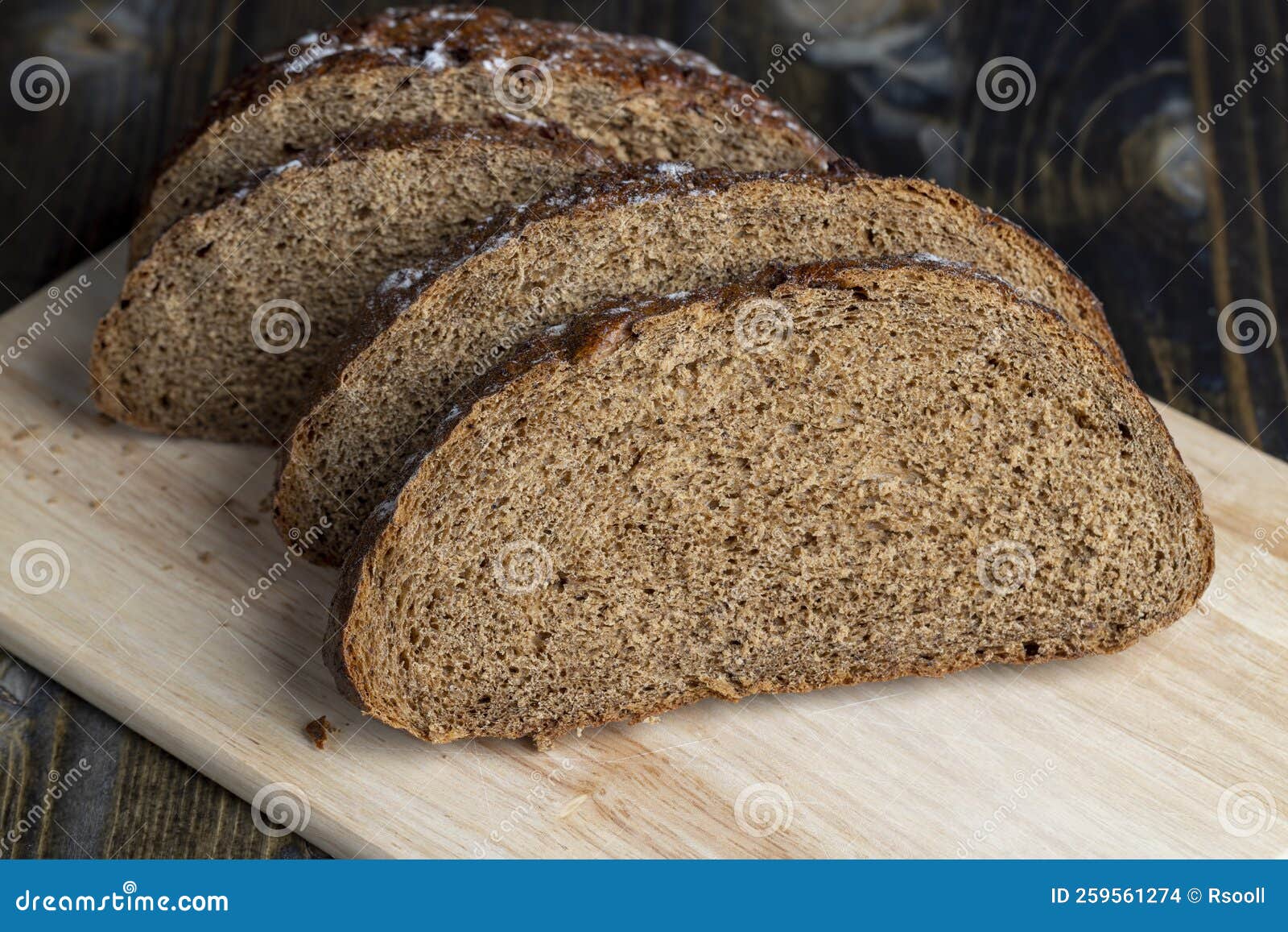 Sliced Black Rye Bread on a Board Stock Photo - Image of black, bakery ...