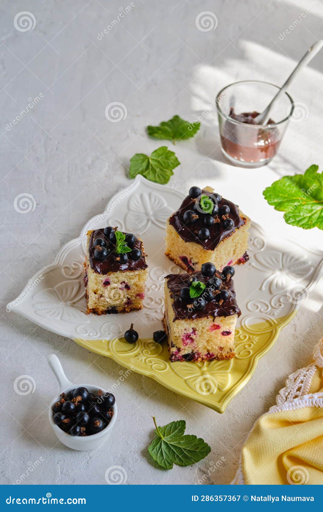 Sliced Blackcurrant Cake Covered with Chocolate Icing on a Square Light ...