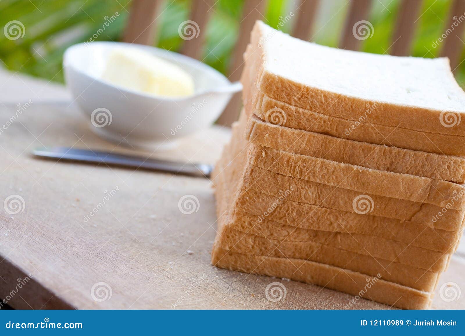 Sliced Bread with Butter on an Outdoor Setting. Stock Image - Image of ...