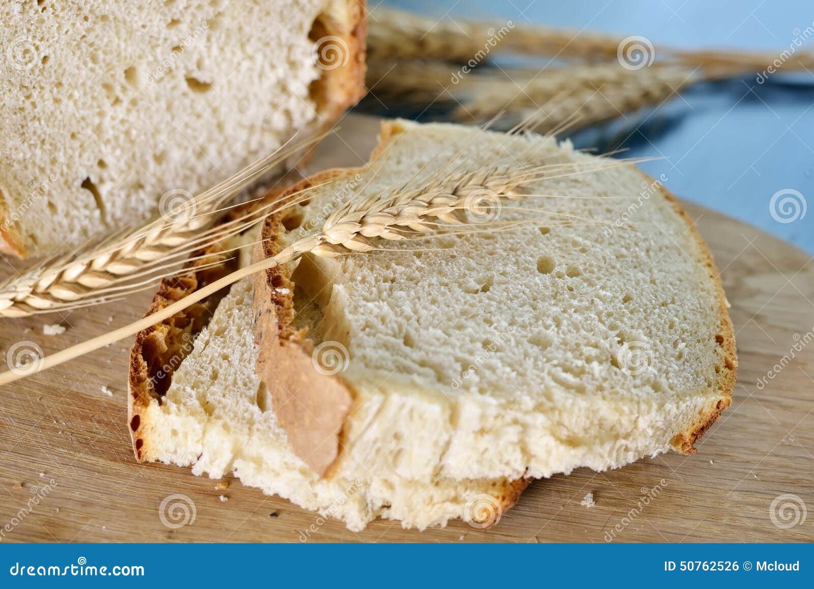 Sliced Bread on a Chopping Board Stock Photo - Image of dinner, healthy ...
