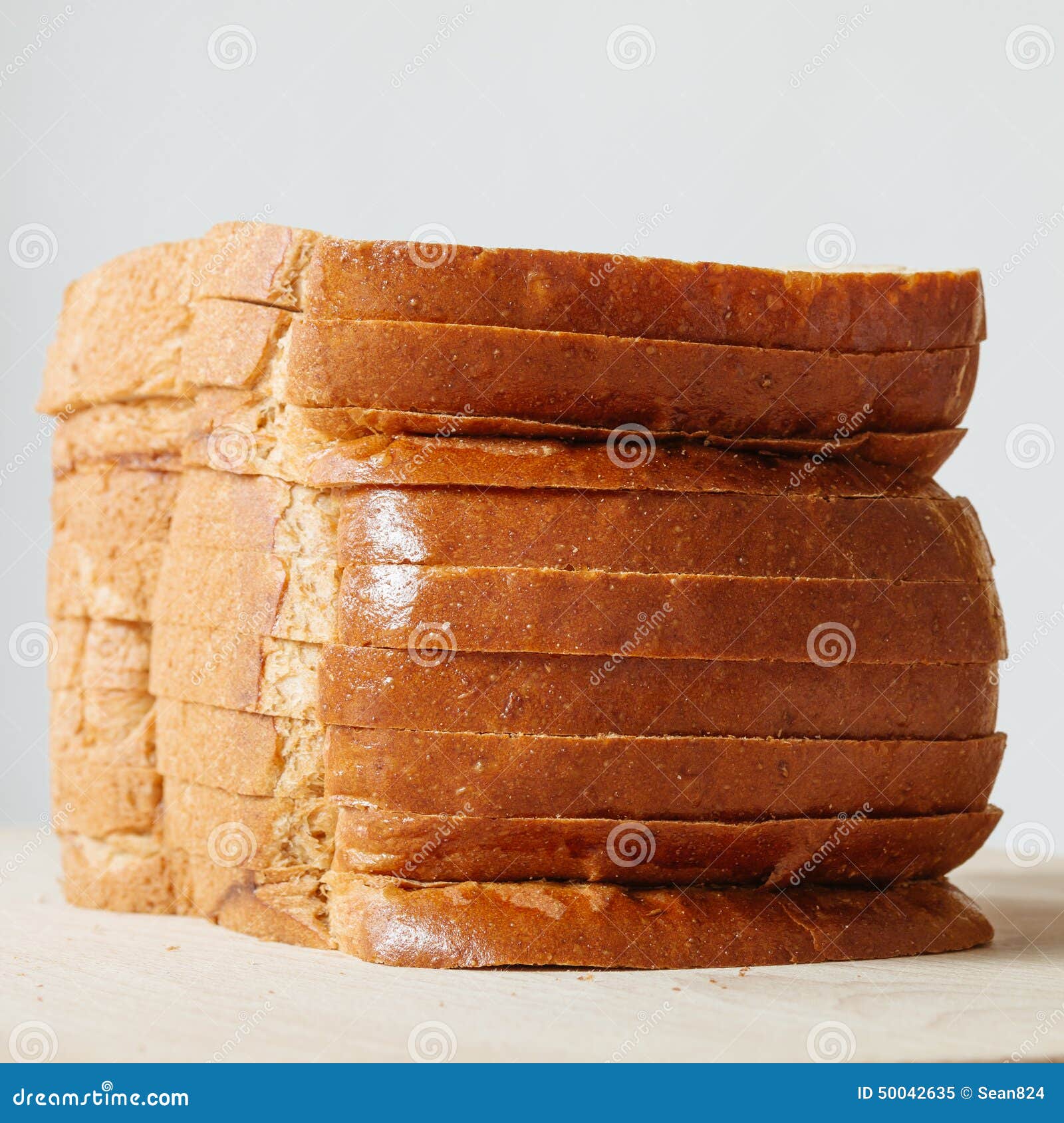 Sliced bread stock image. Image of wheat, board, grain - 50042635