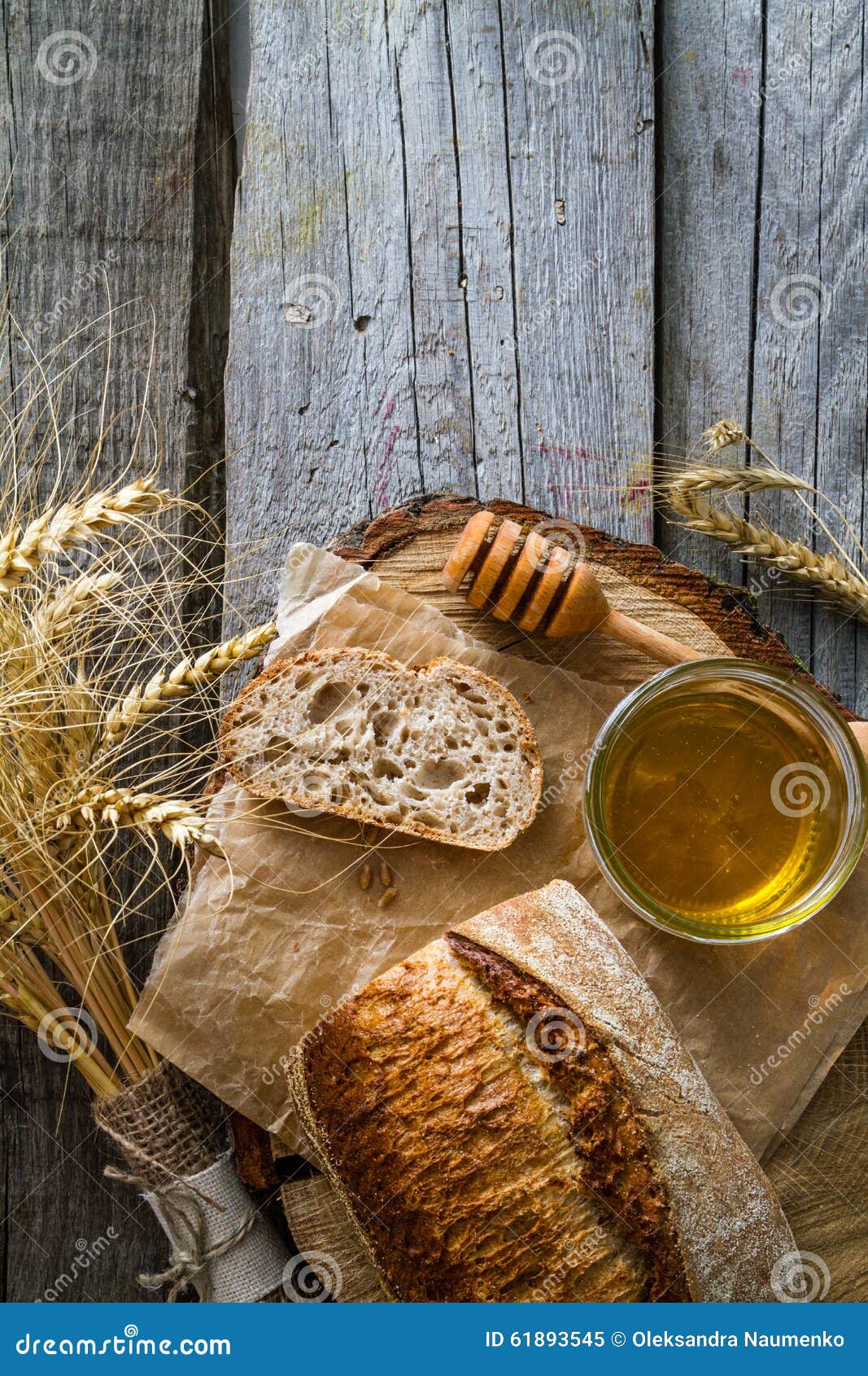 Sliced Bread, Honey, Wheat, Rustic Wood Background Stock Image - Image ...