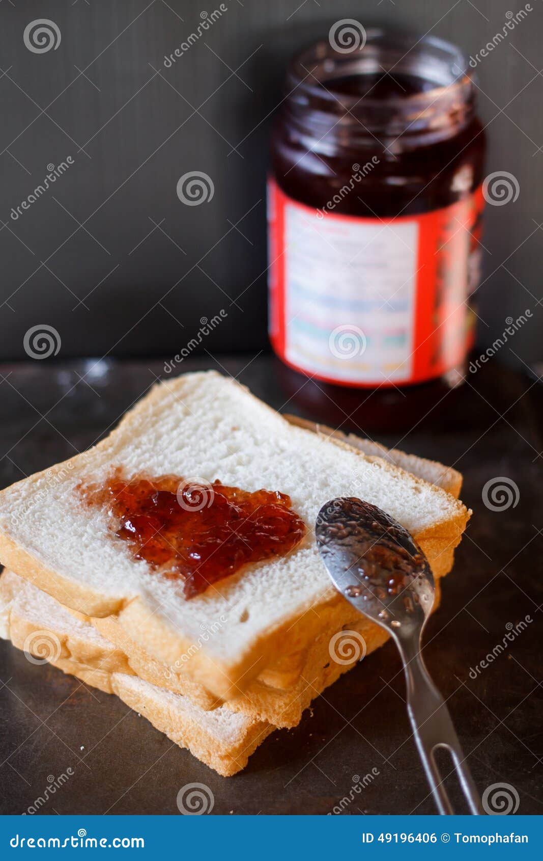 Sliced bread with jam stock photo. Image of ingredient - 49196406