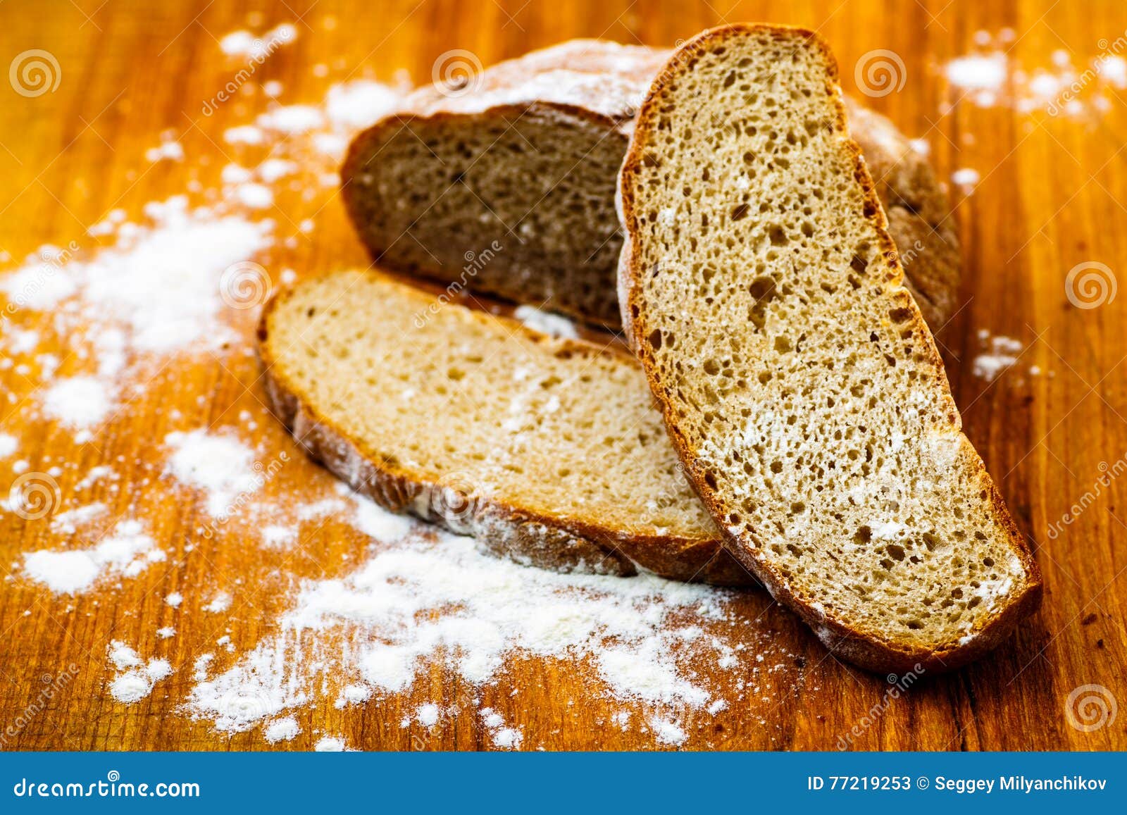And Sliced Bread in One Piece a Bit of Butter Lying on Woo Stock Image ...