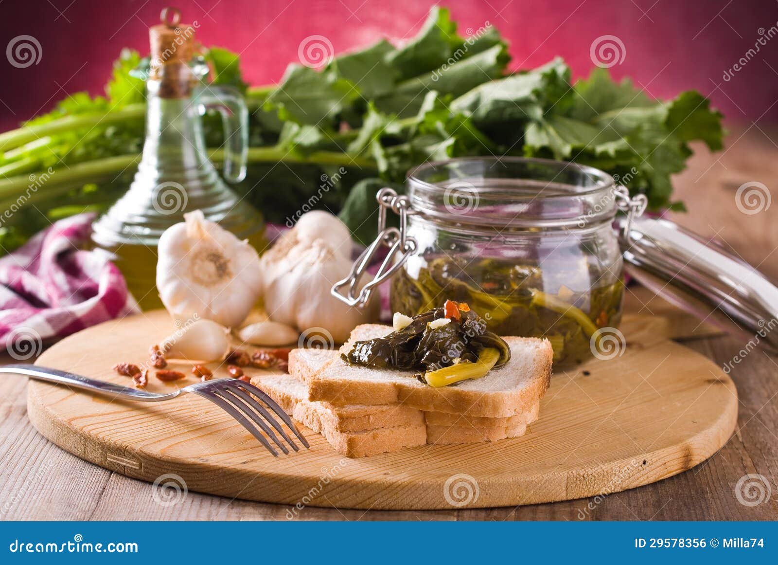 Sliced Bread with Turnip Tops Under Oil. Stock Photo - Image of glass ...