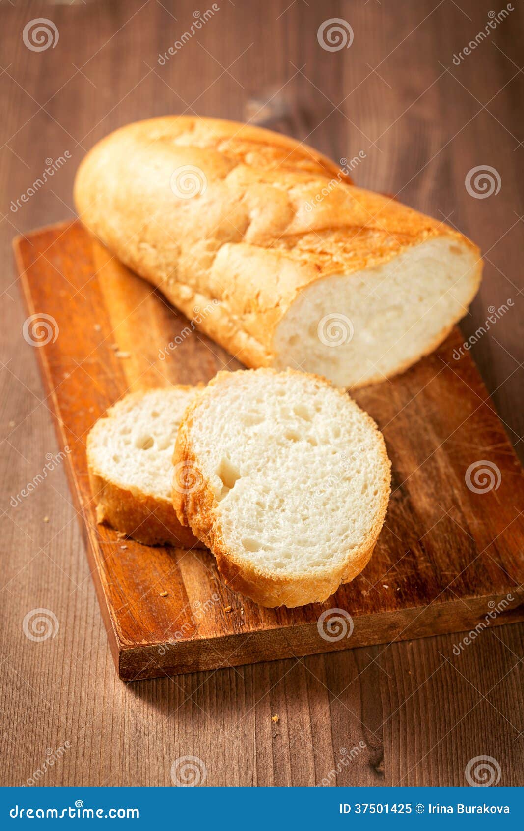Sliced Bread on Wooden Table Stock Image - Image of french, gourmet ...