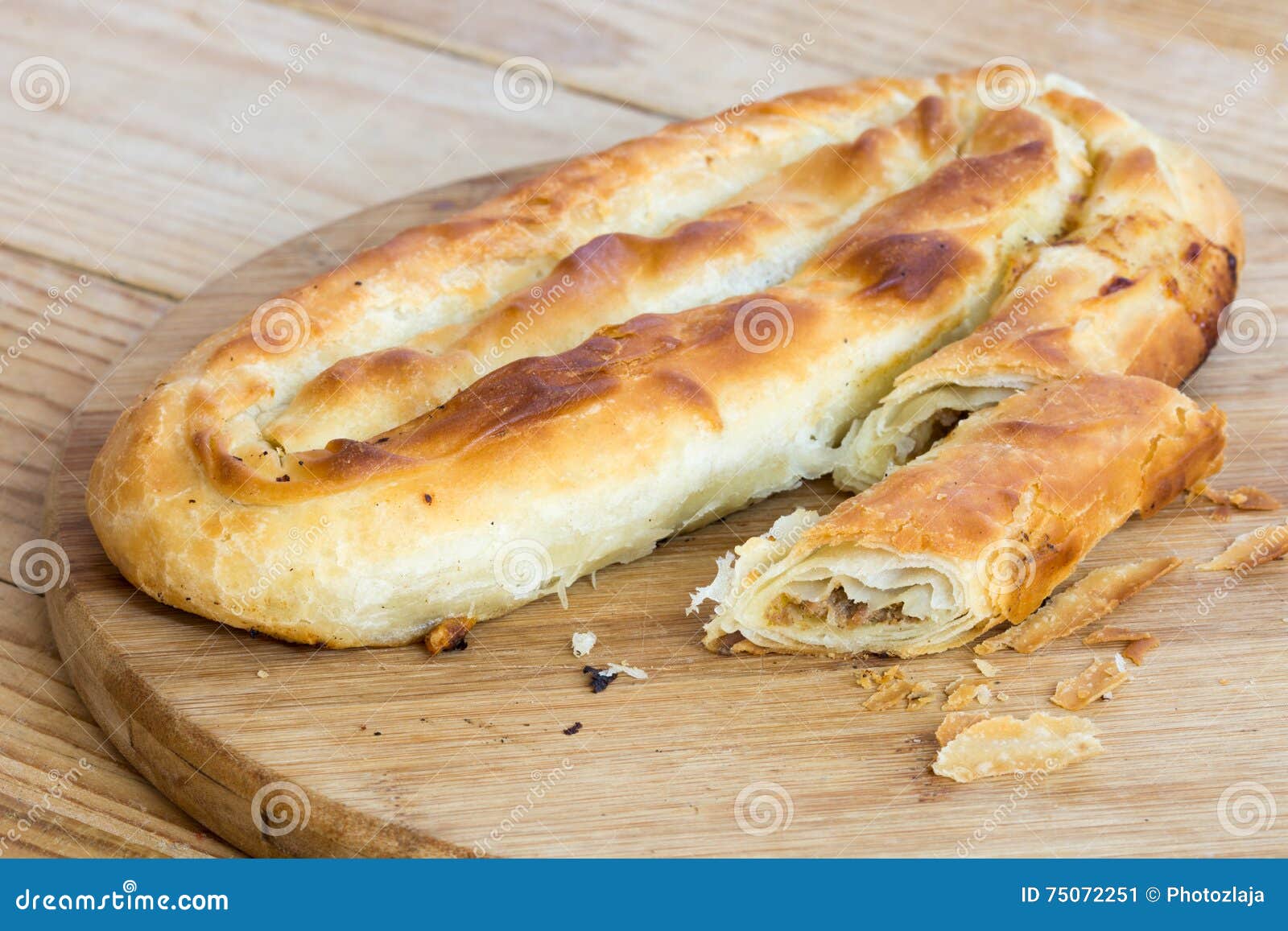 Sliced Burek with Meat on the Wooden Board. Rustic Food. Stock Image ...