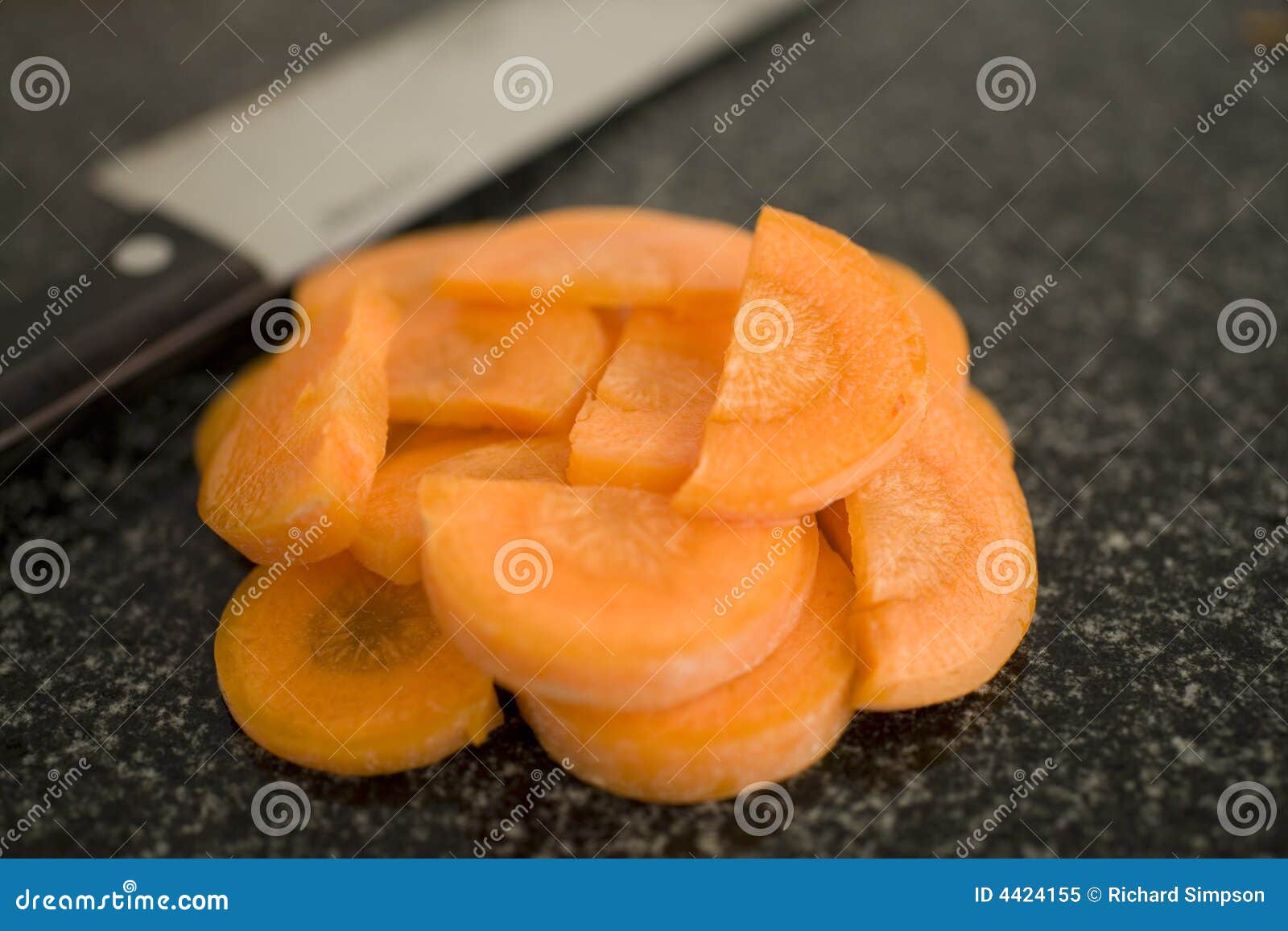 Sliced carrot stock image. Image of preparation, knife - 4424155