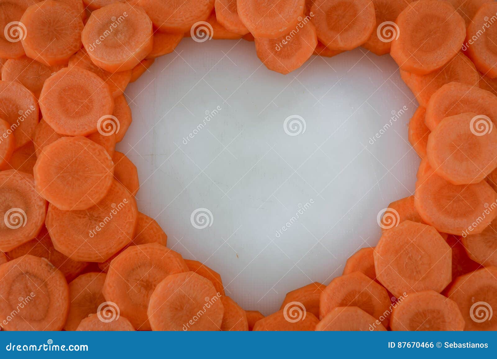 Sliced Carrots Making an Heart Shape Stock Photo - Image of heart ...