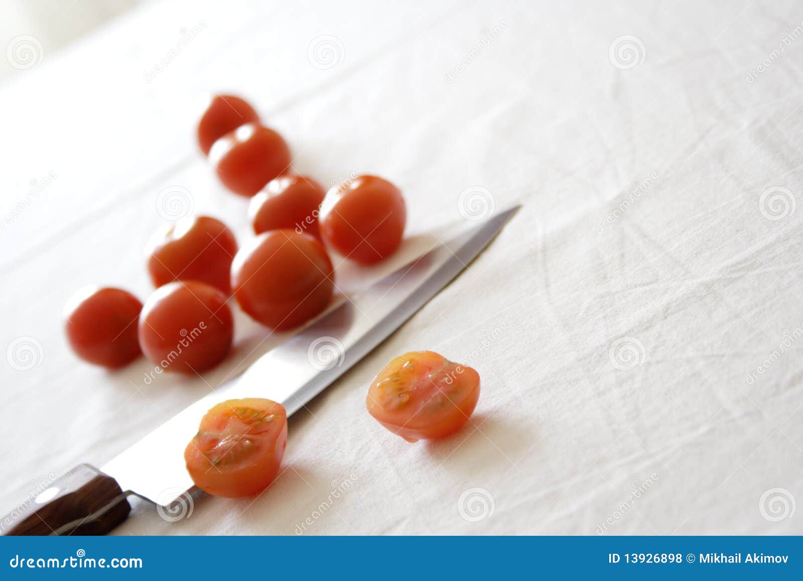 Sliced cherry tomatoes stock photo. Image of knife, vegetable - 13926898