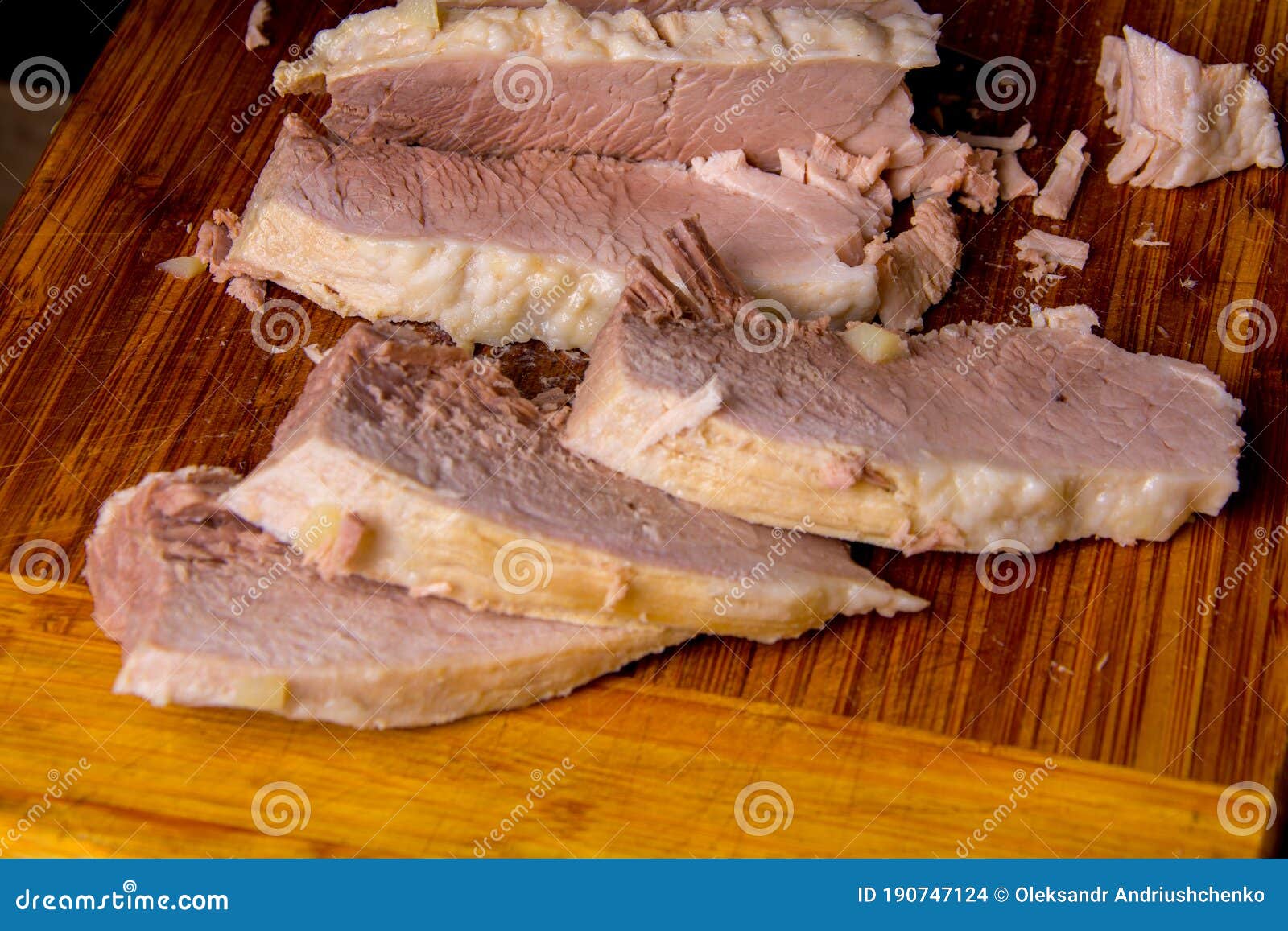 Sliced cooked meat stock photo. Image of cooked, board - 190747124